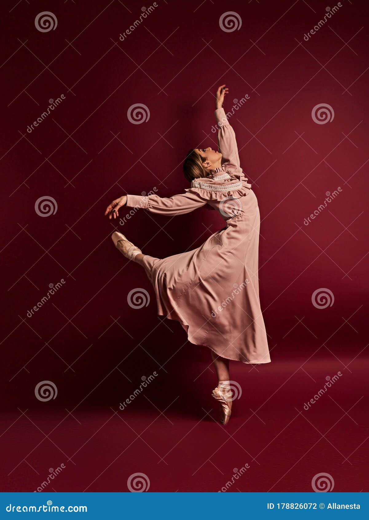 Ballet Dancer Or Classic Ballerina Dancing Isolated On Red Background