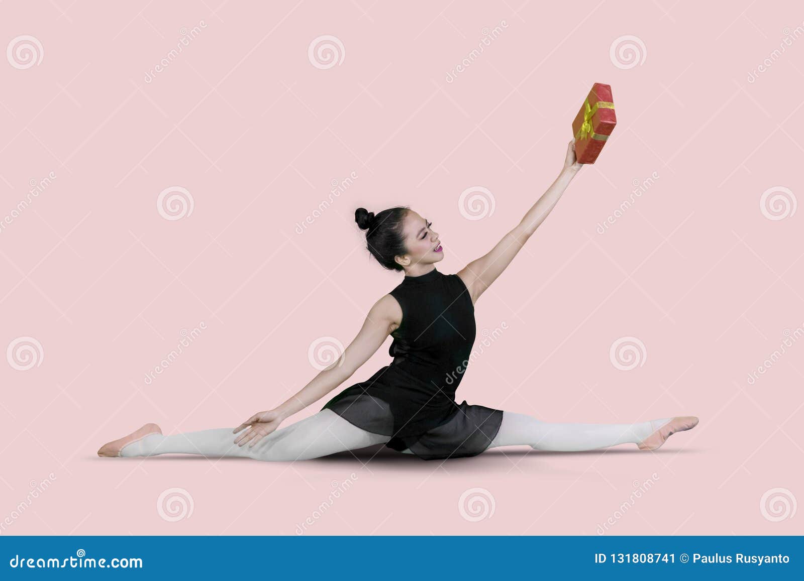Ballet Dancer with Gift Box Doing Split Exercise Stock Image - Image of ...