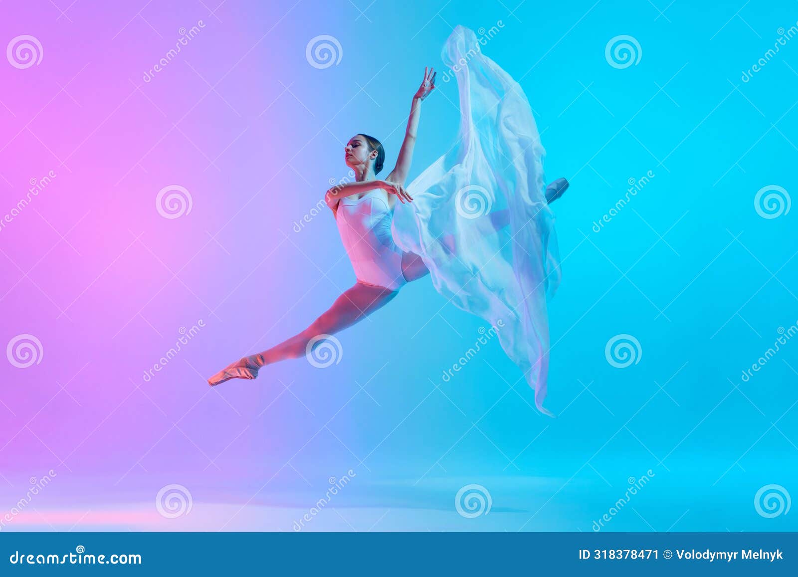 Ballet Dancer Performs Jumping Split in Motion with Flowing White Cloth ...