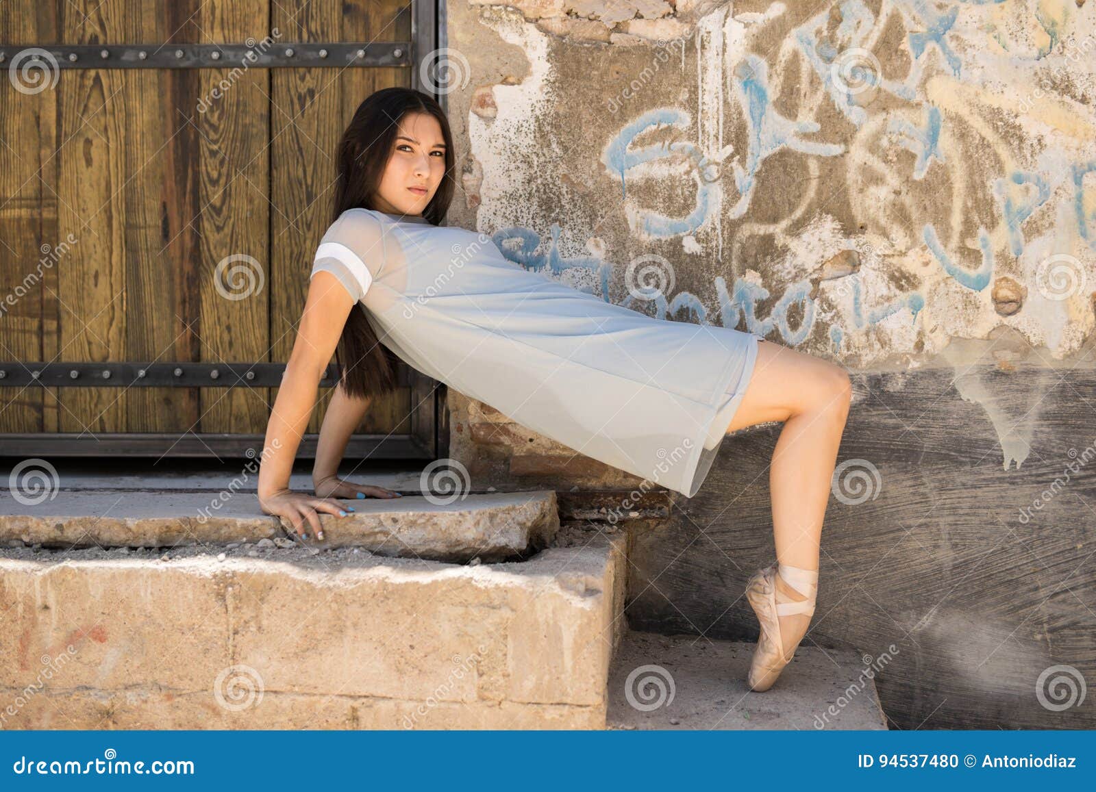 Ballet Dancer Standing En Pointe Stock Photo - Image of door, young ...