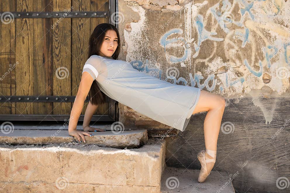 Ballet Dancer Standing En Pointe Stock Photo - Image of door, young ...