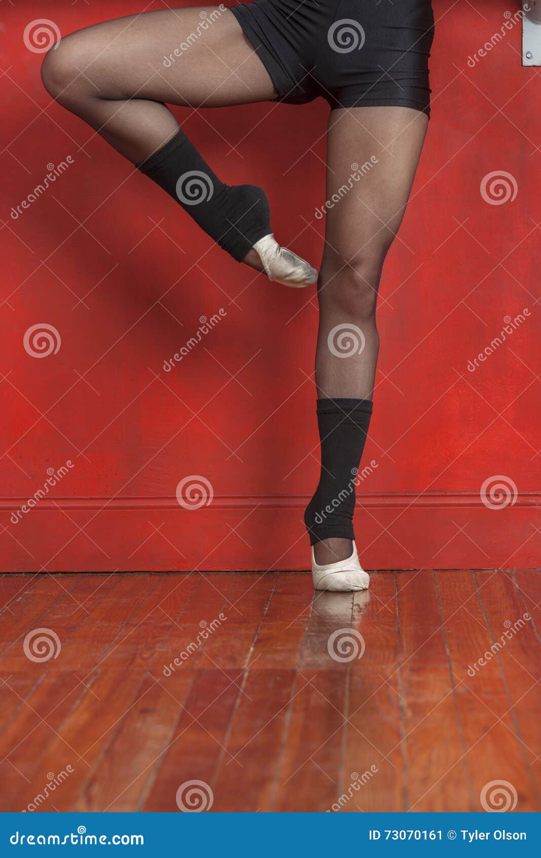 Ballet Dancer Standing on One Leg in Studio Stock Image - Image of ...