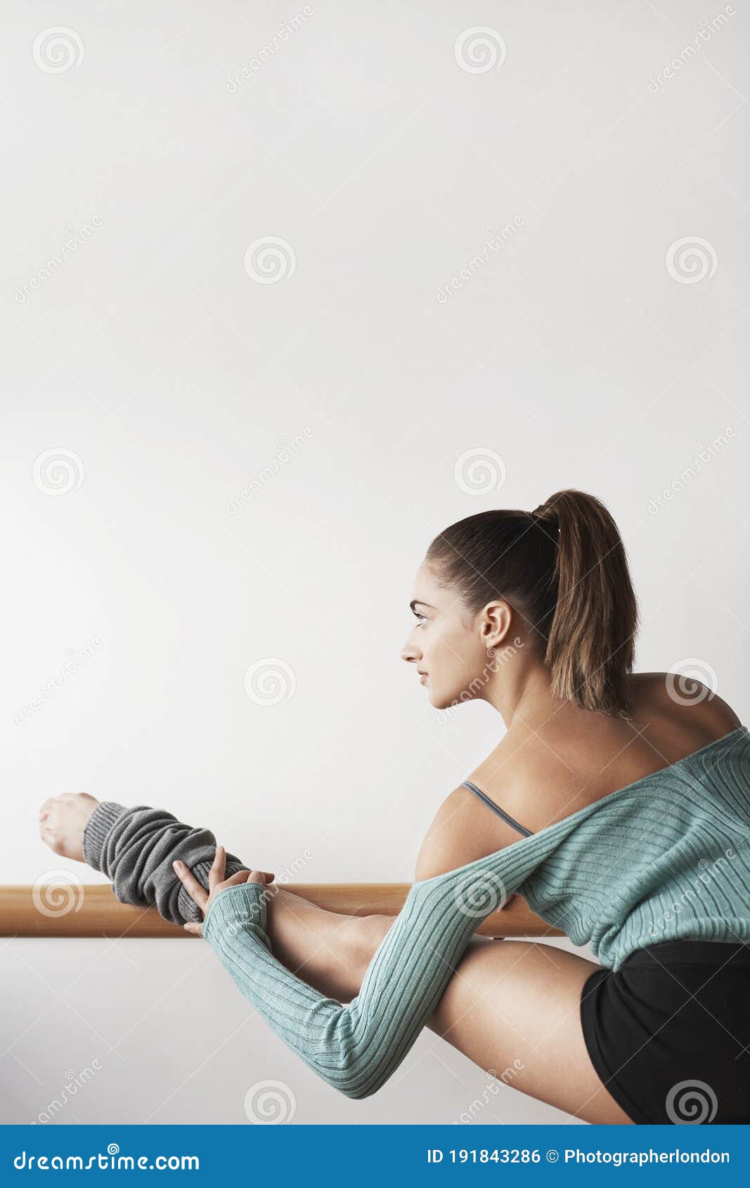 Ballet Dancer Stretching at Bar Stock Photo - Image of person, dancer ...