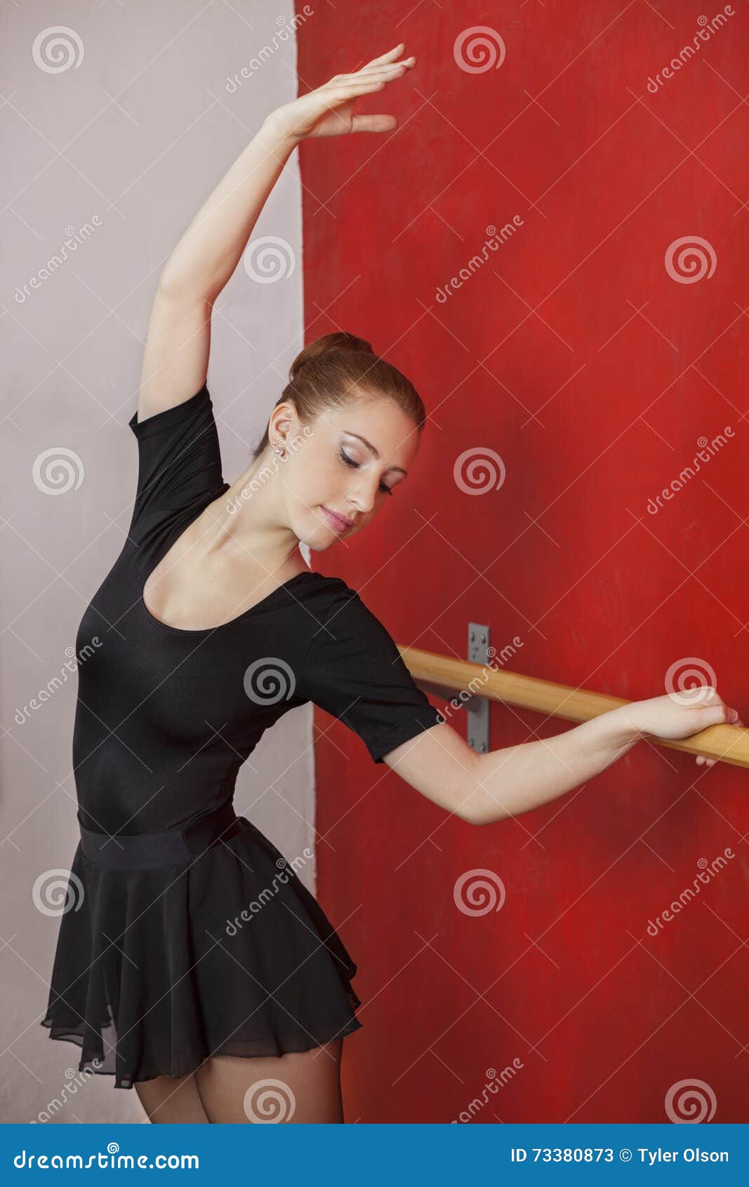 Ballet Dancer Stretching at Barre in Studio Stock Image - Image of ...