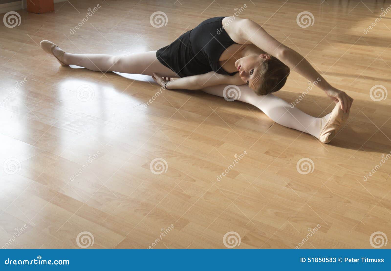 Ballet dancer warming up stock image. Image of working - 51850583