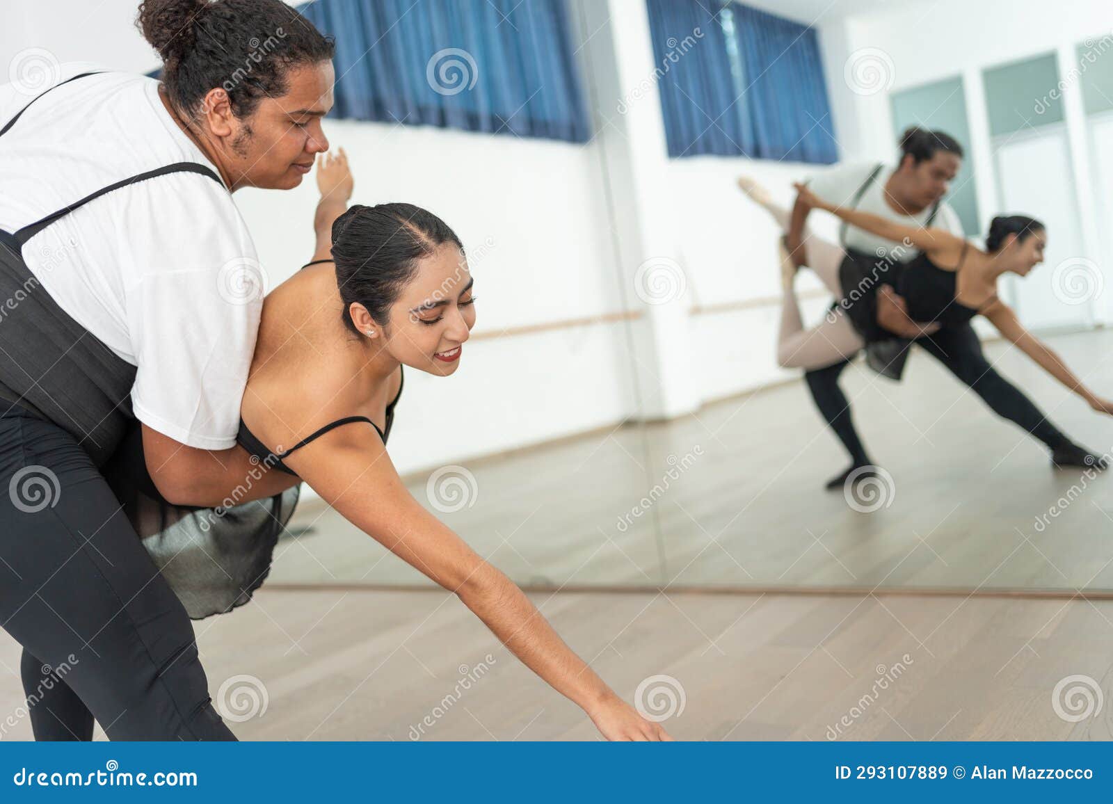 Ballet Dancers Couple Practicing in Front of the Mirror in a Dance ...