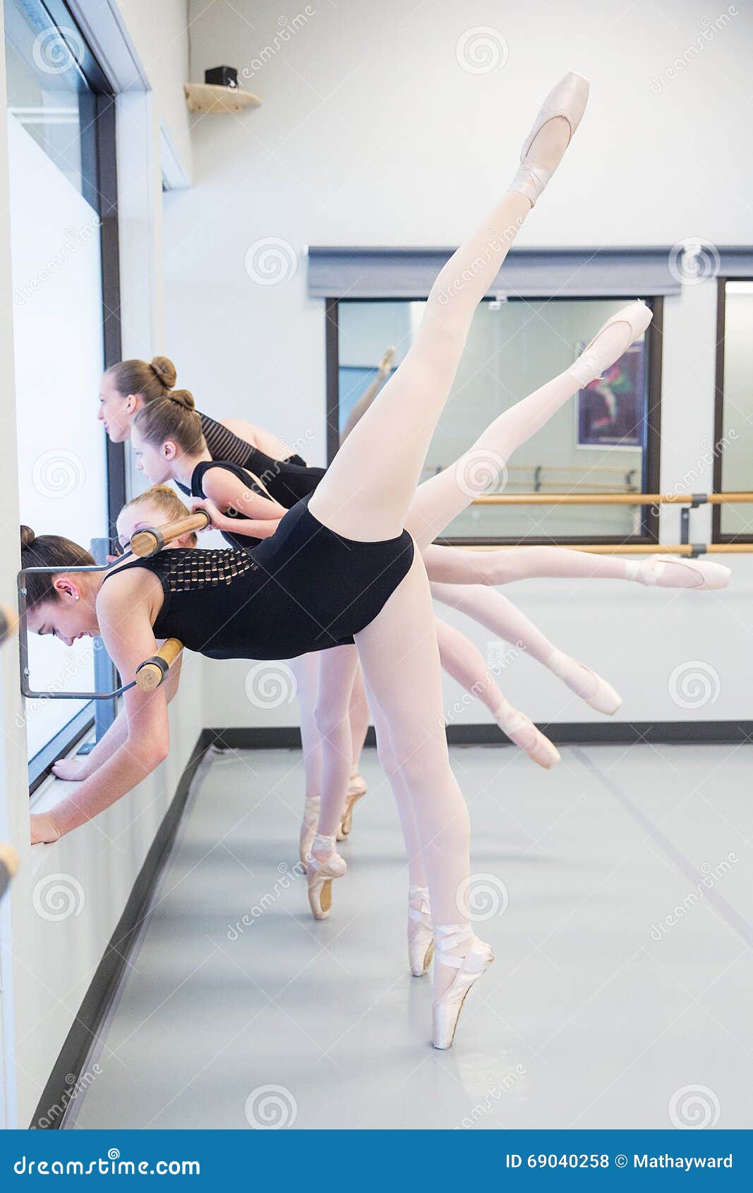 Ballet Dancers Create a Shape with Their Legs Stock Photo - Image of ...