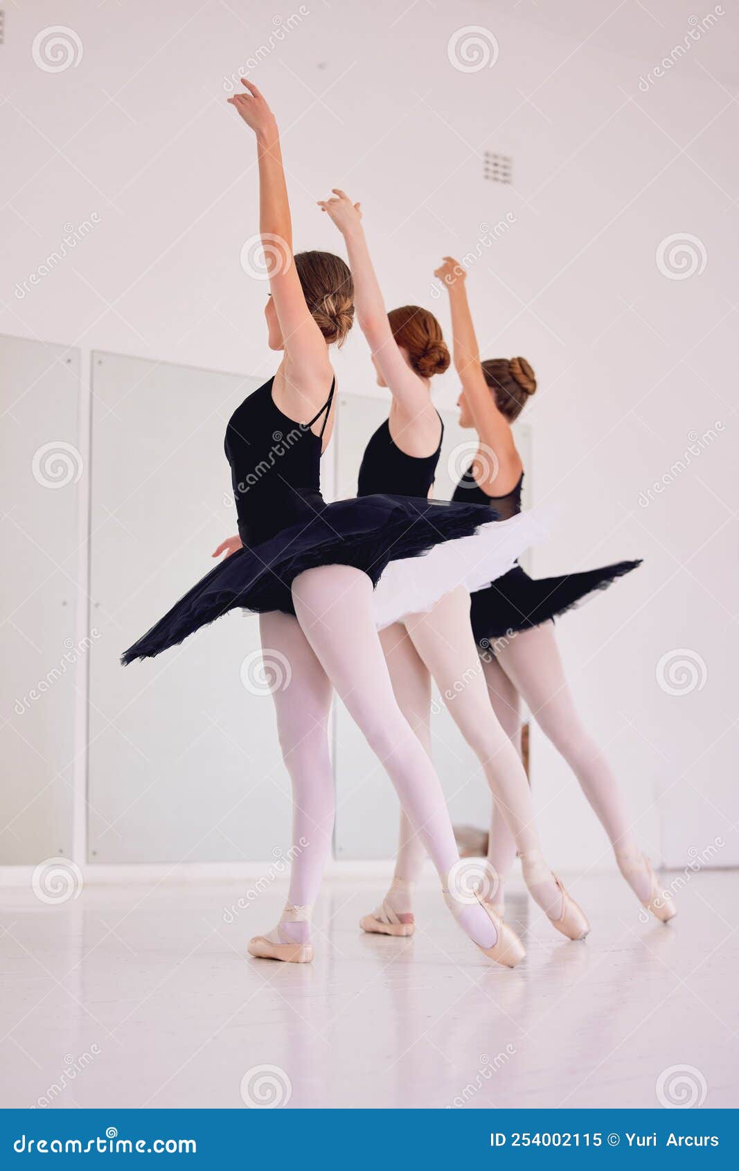 Ballet Dancers Dancing and Practicing in a Dance Studio Together ...