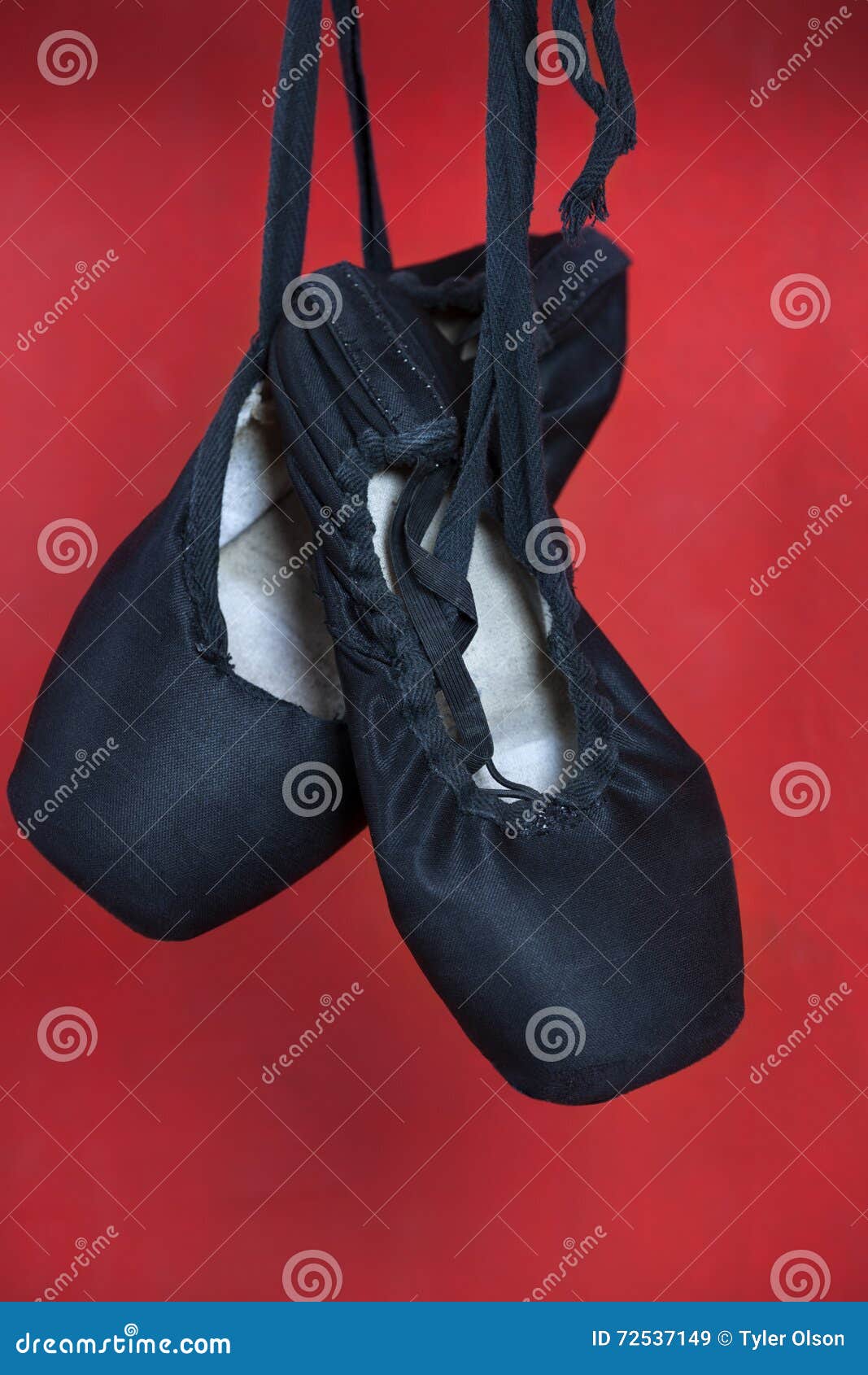 Ballet Shoes Hanging Against Red Wall Stock Image - Image of fashion ...
