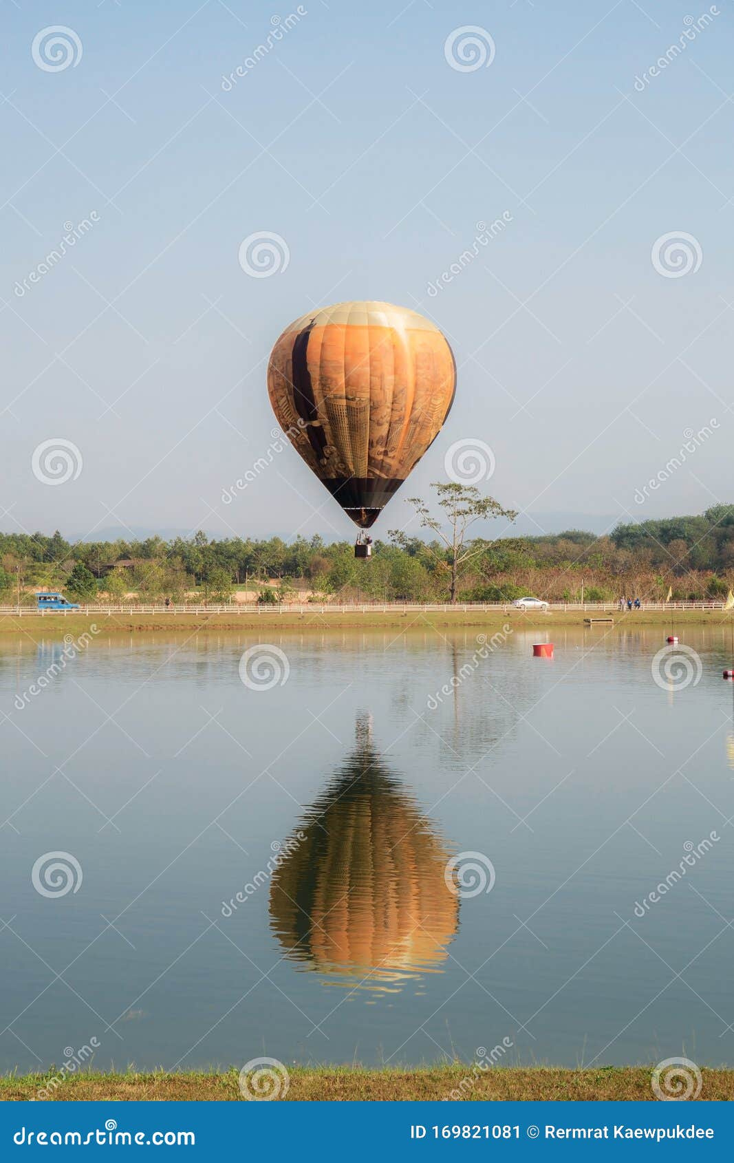 Balloon in field at lake stock image. Image of blue - 169821081