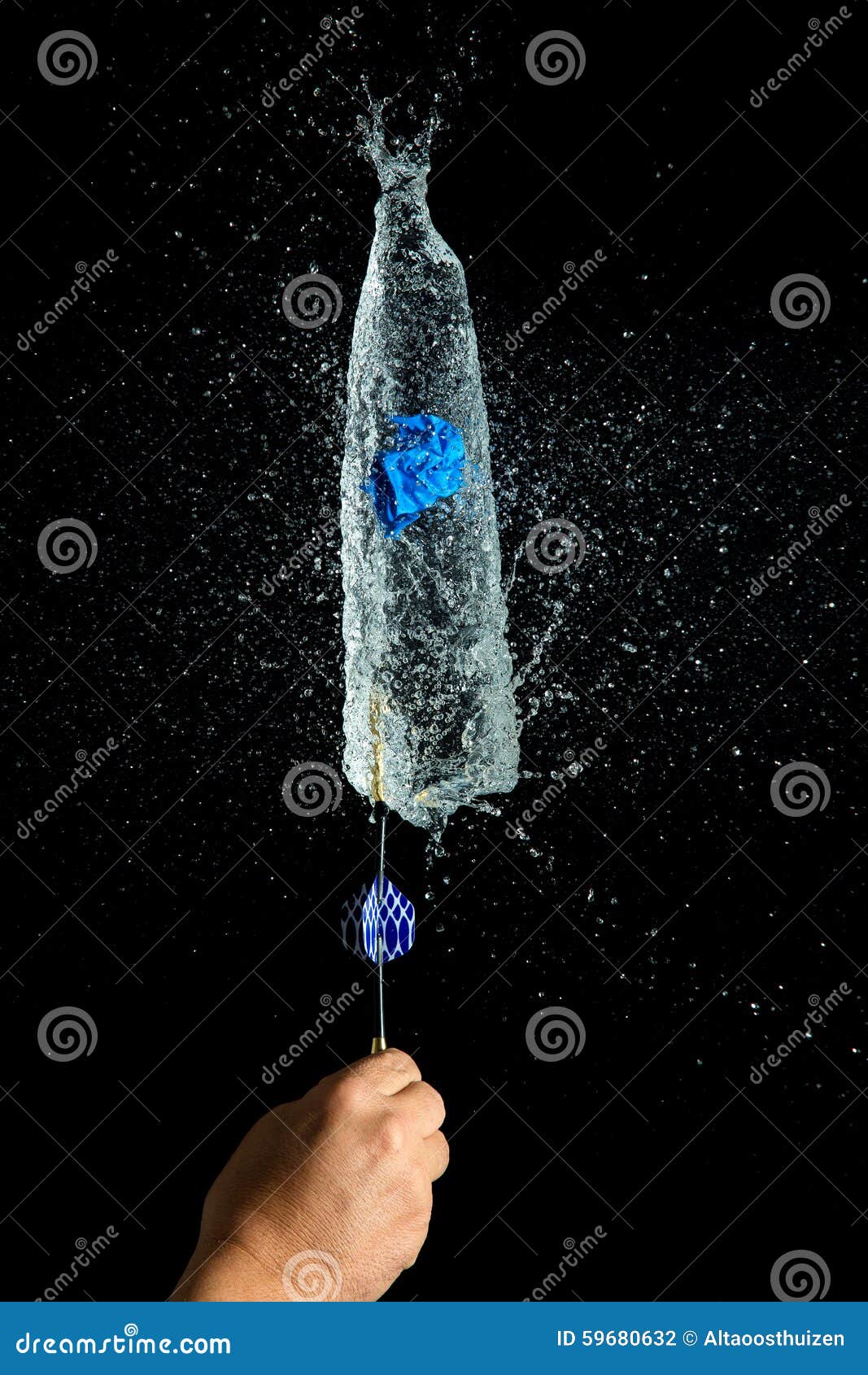 Balloon Filled with Water is Popped with Dart To Make a Mess Stock ...