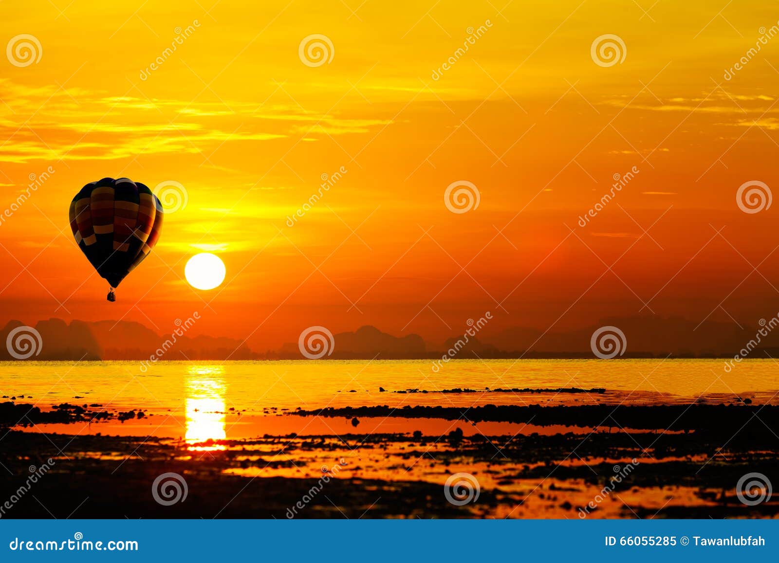 Balloon Flying into Sunset Over the Sea. Stock Image - Image of ...