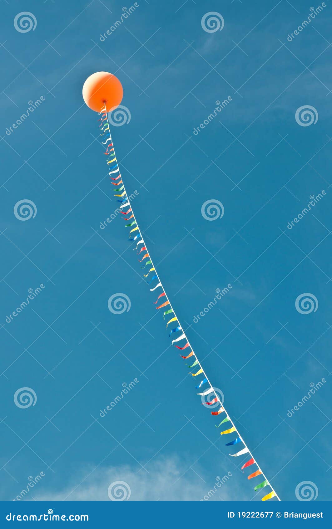 Balloon with Streamers in a Blue Sky Stock Image - Image of blowing ...