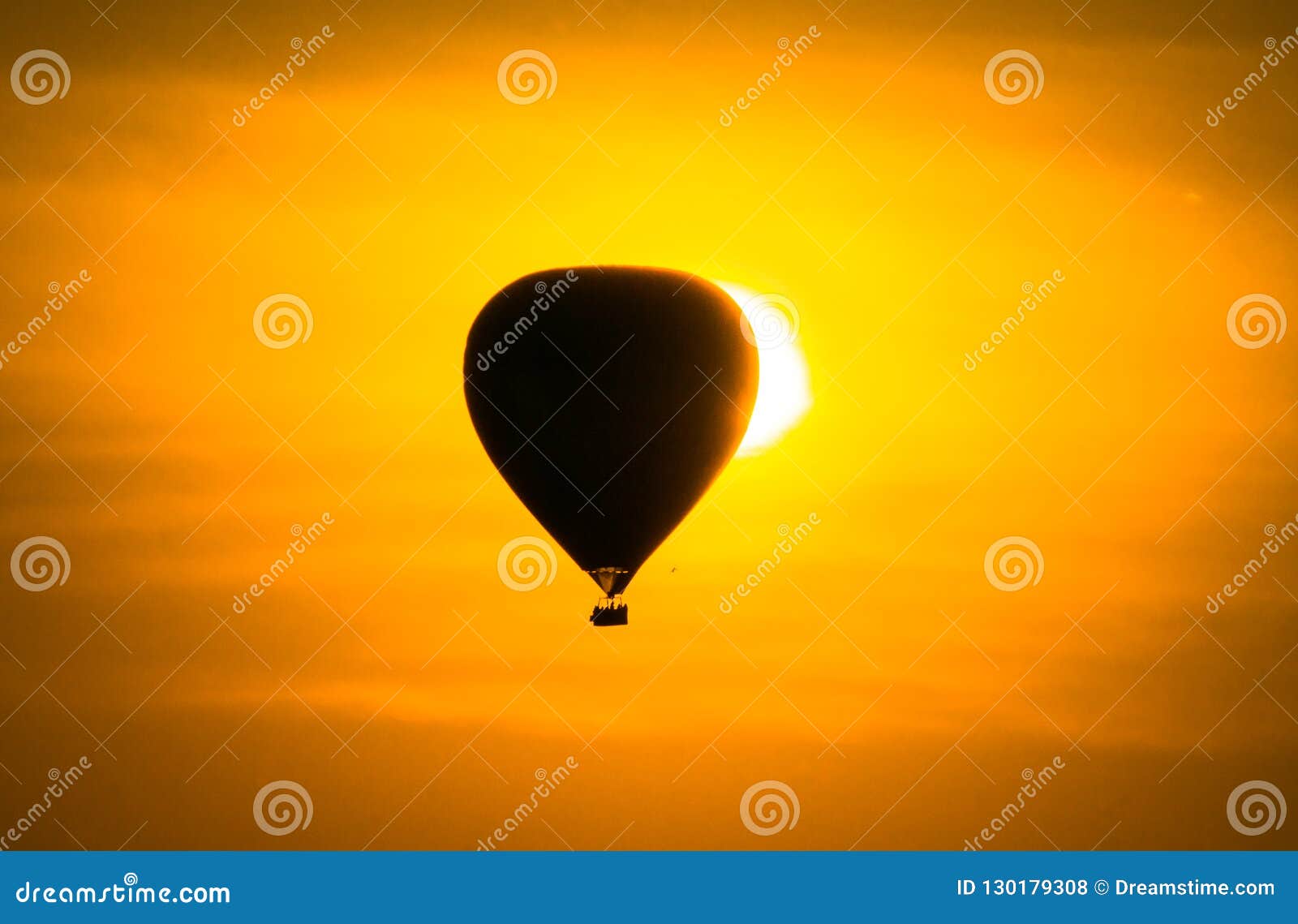 Balloon sunrise eclipse stock photo. Image of dawn, cover - 130179308