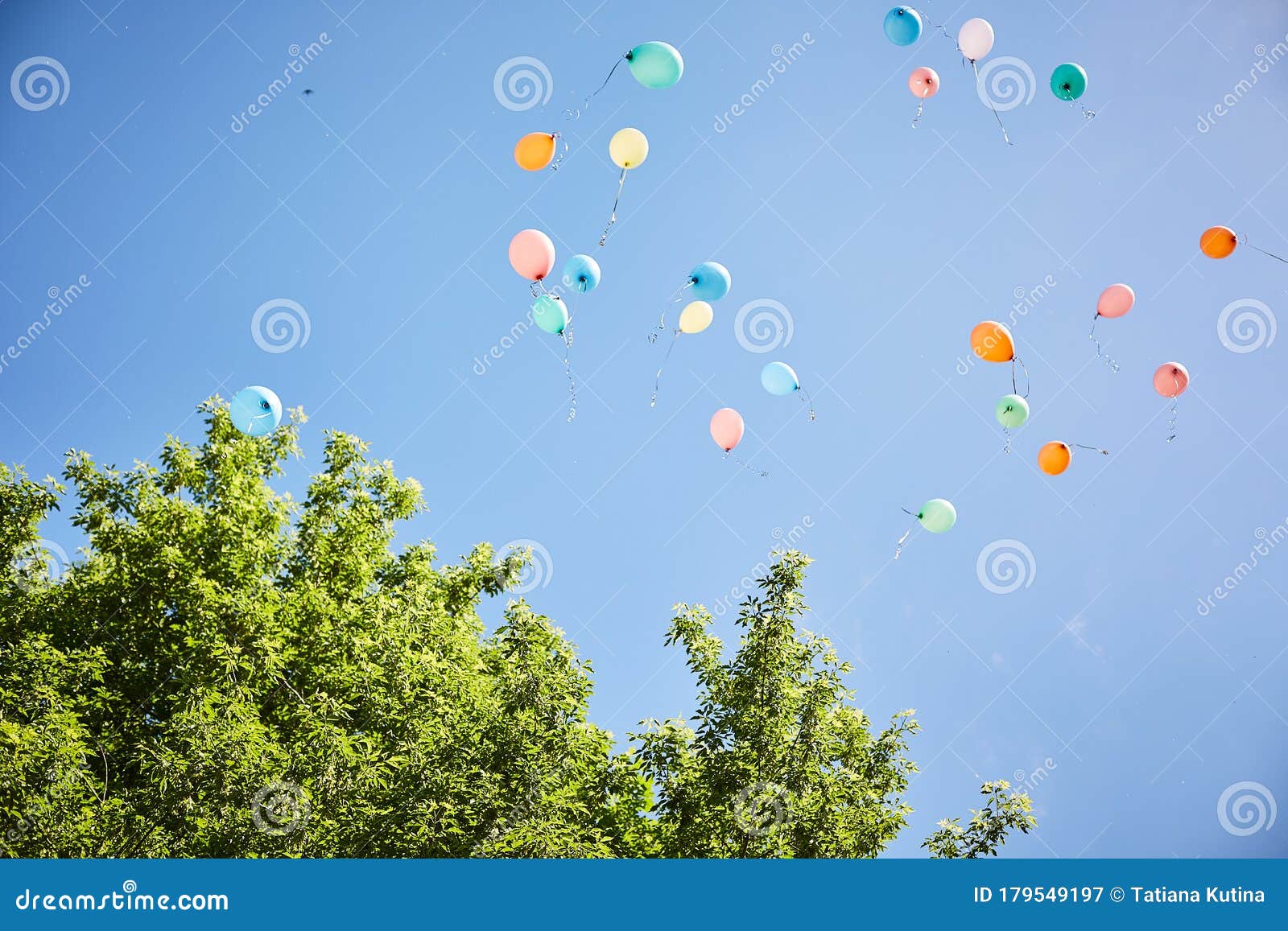 Balloons Fly Away on a Background of Blue Sky. Stock Image - Image of ...