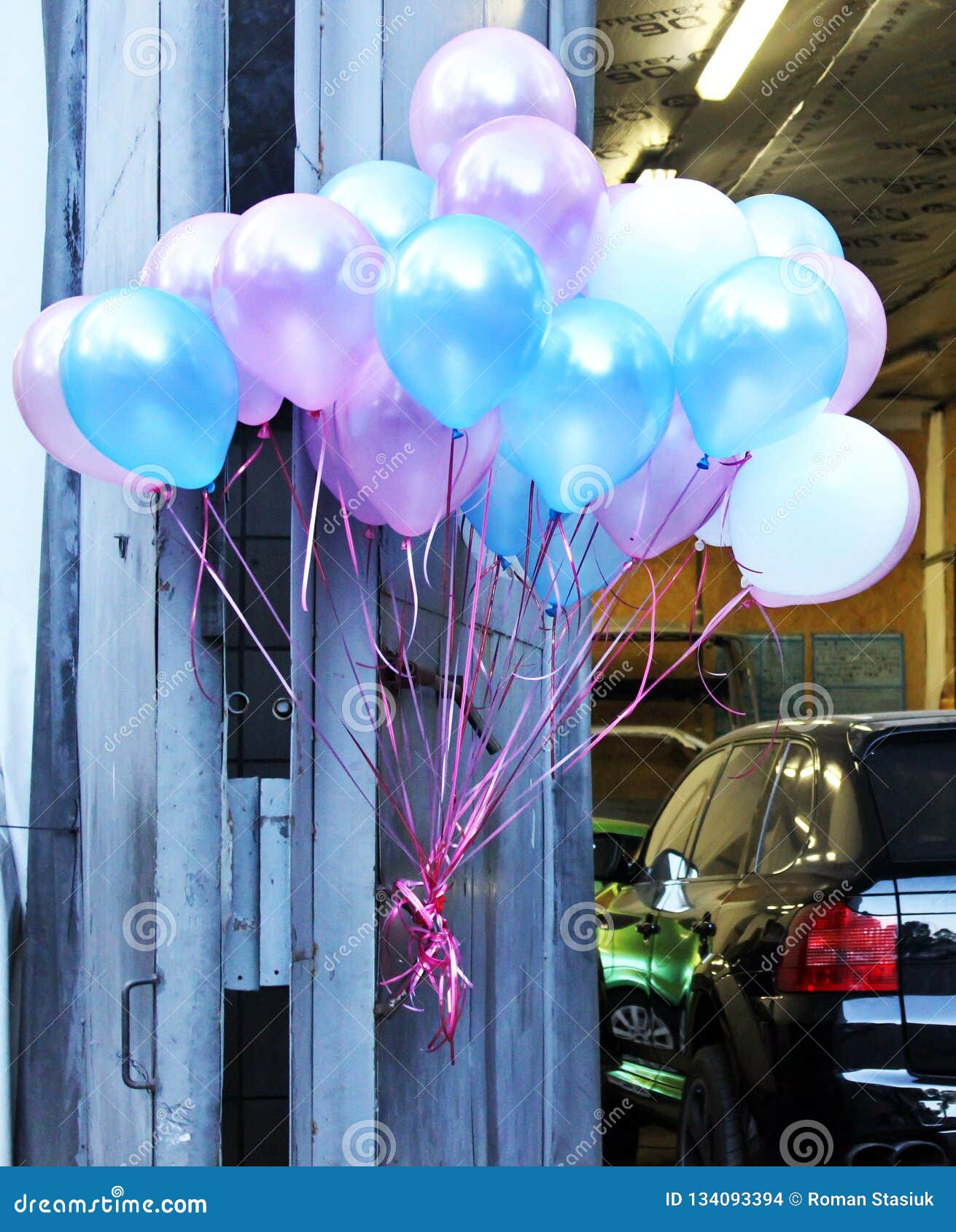 Balloons Tethered in the Street Stock Photo - Image of colorful ...