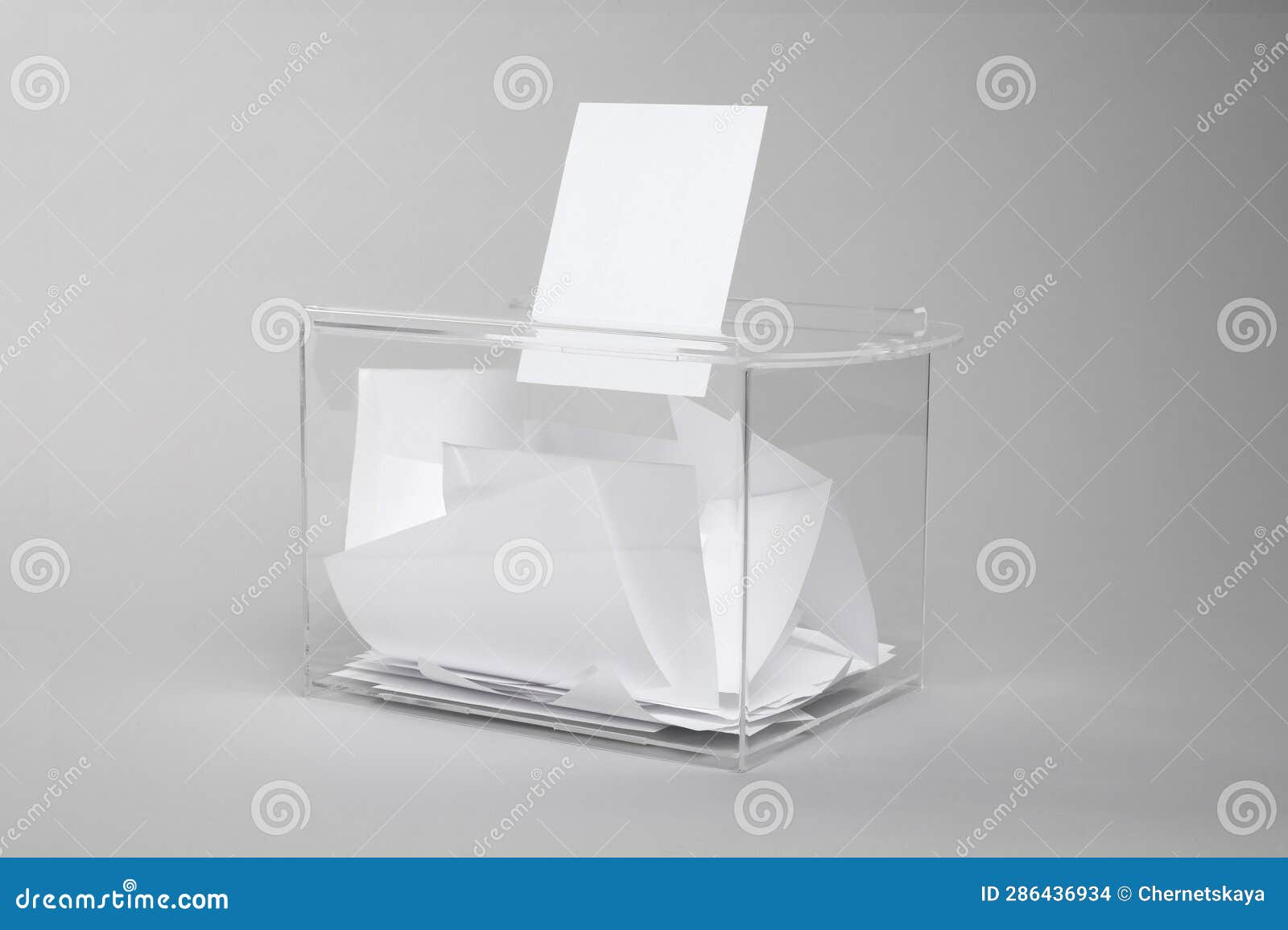 Ballot Box with Votes on Light Grey Background. Election Time Stock ...