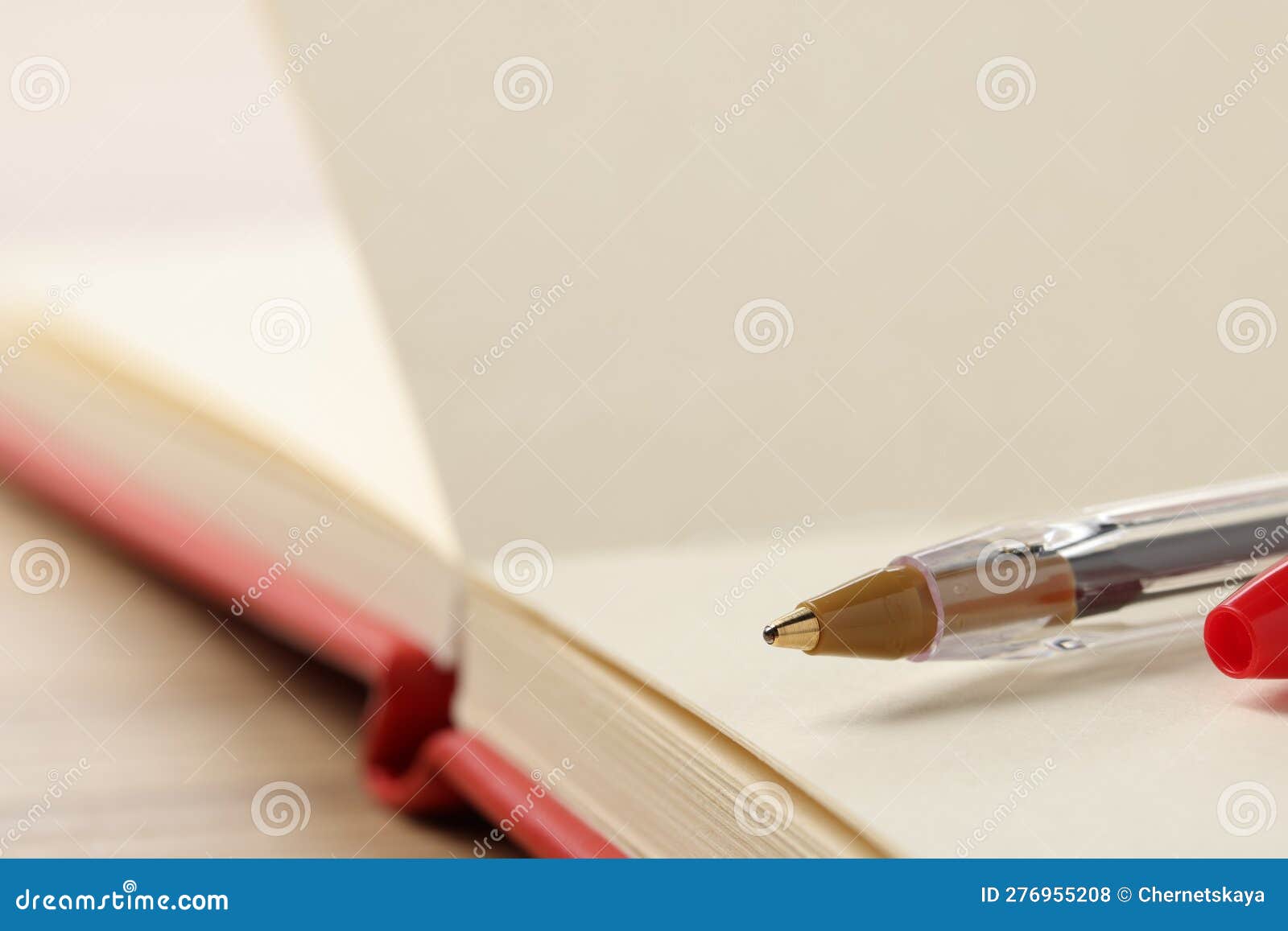 Ballpoint Pen and Notebook on Table, Closeup. Space for Text Stock ...