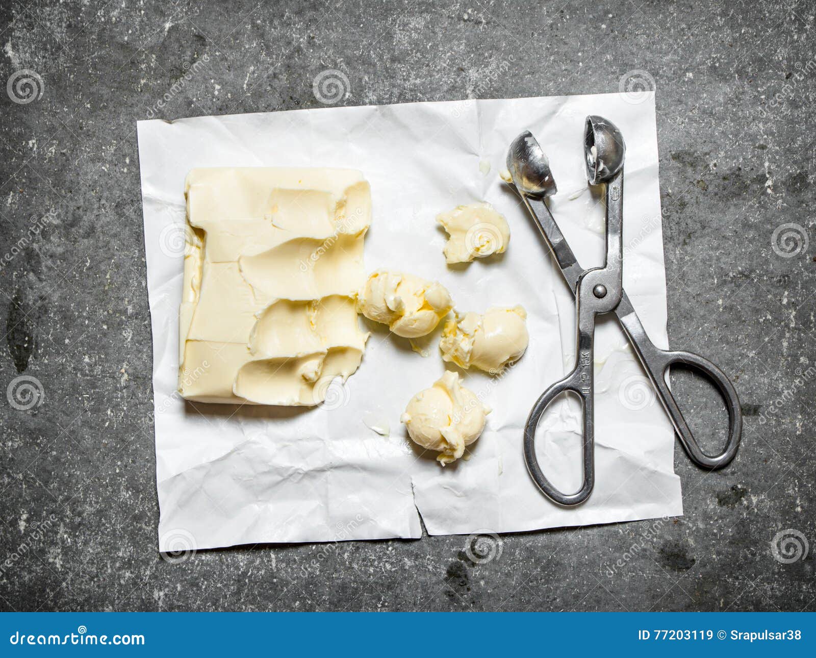 Balls of Butter with a Measuring Scissors. Stock Image - Image of ...