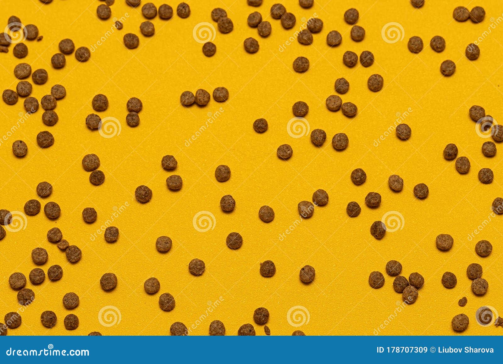 Balls of Cat Food on a Yellow Background Stock Image - Image of feed ...