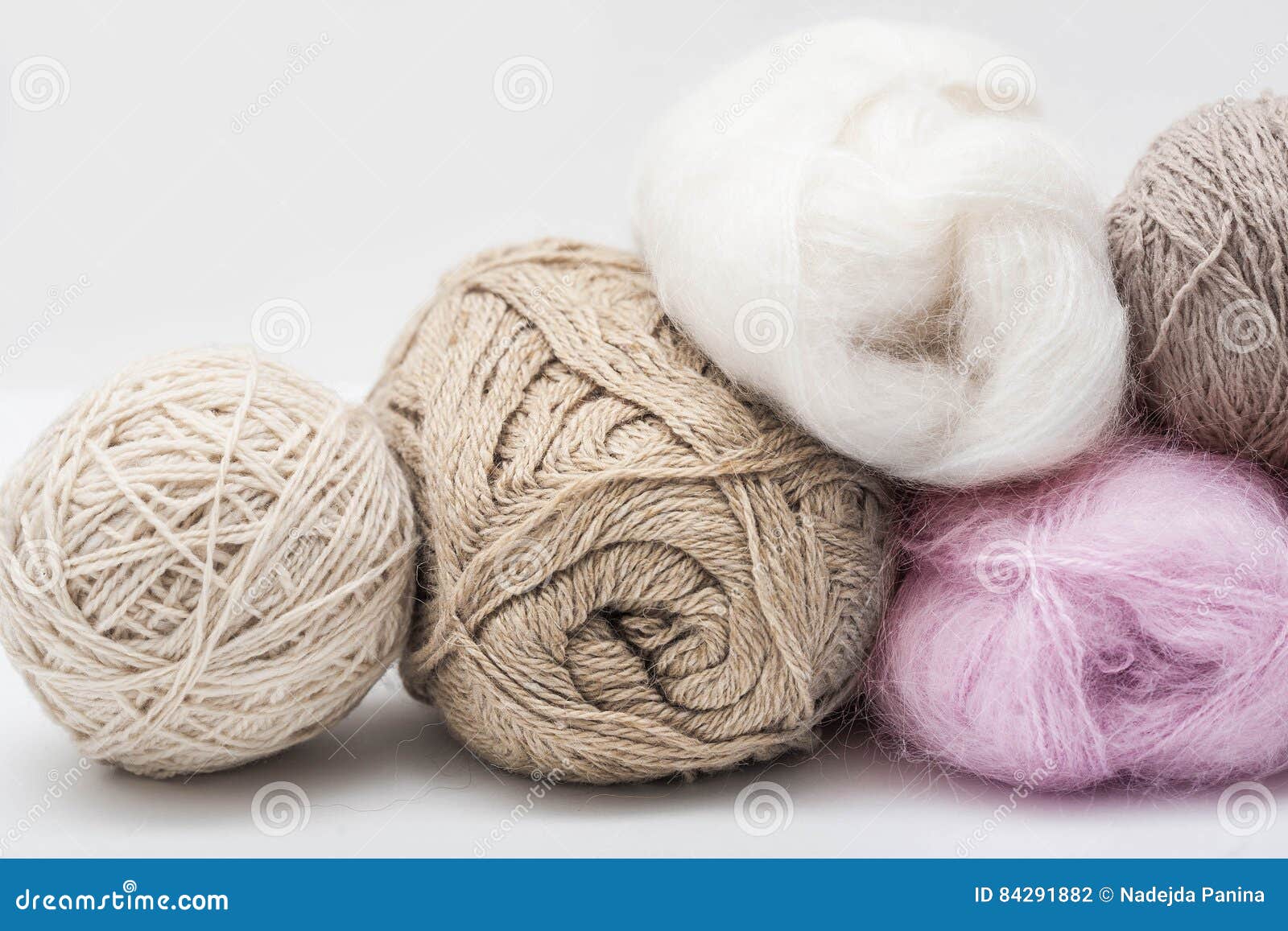 Balls of Wool on Grey Background Stock Photo - Image of clothing, hobby ...
