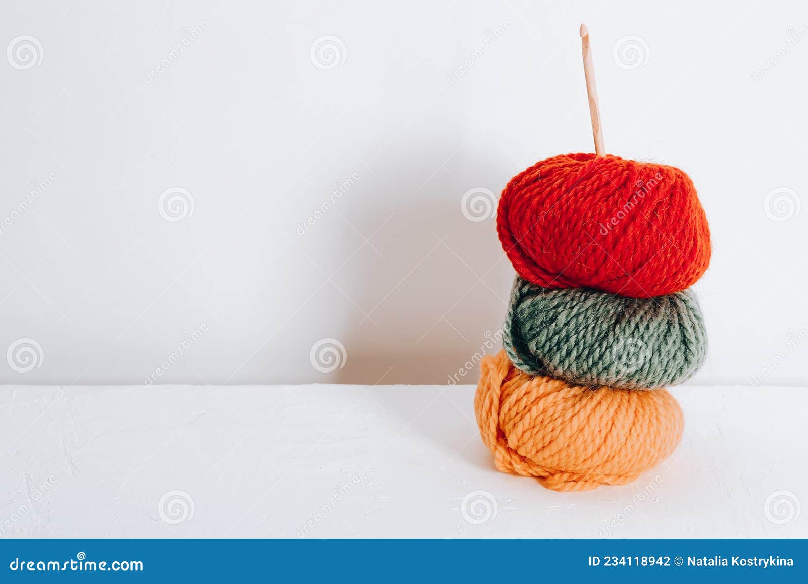 Balls of Wool for Knitting in Autumn Colors on a White Background Stock ...
