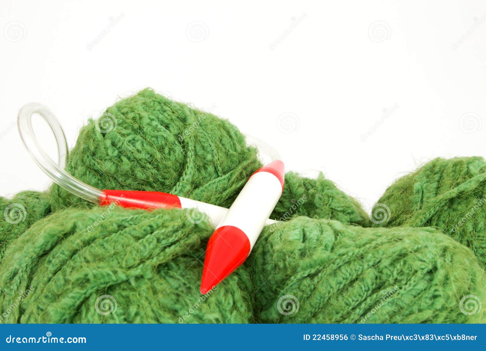 Balls of Wool with a Knitting Needle Stock Photo - Image of clothing ...