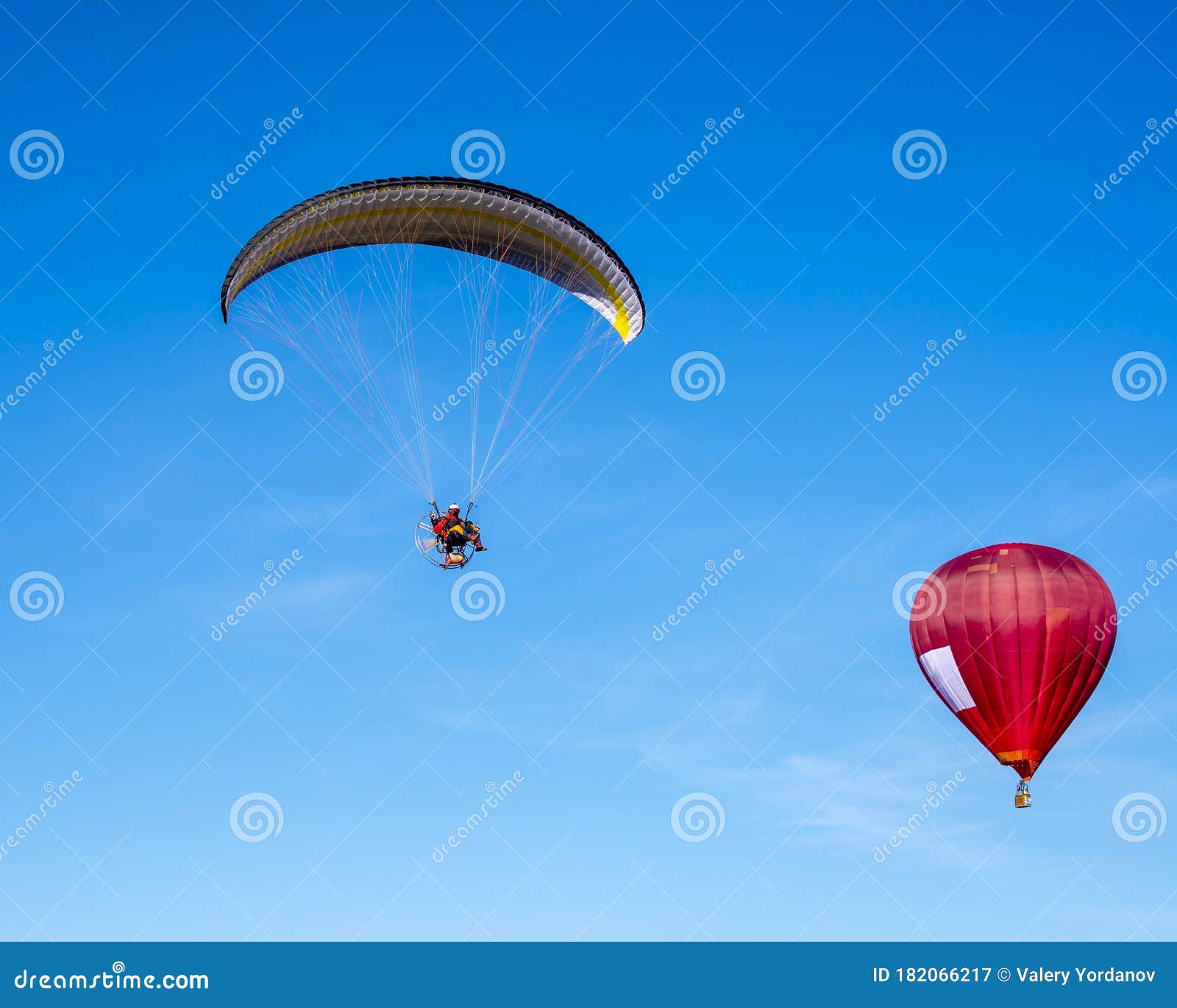 Paraglider Withe Red Hot Air Balloon Stock Image - Image of high ...