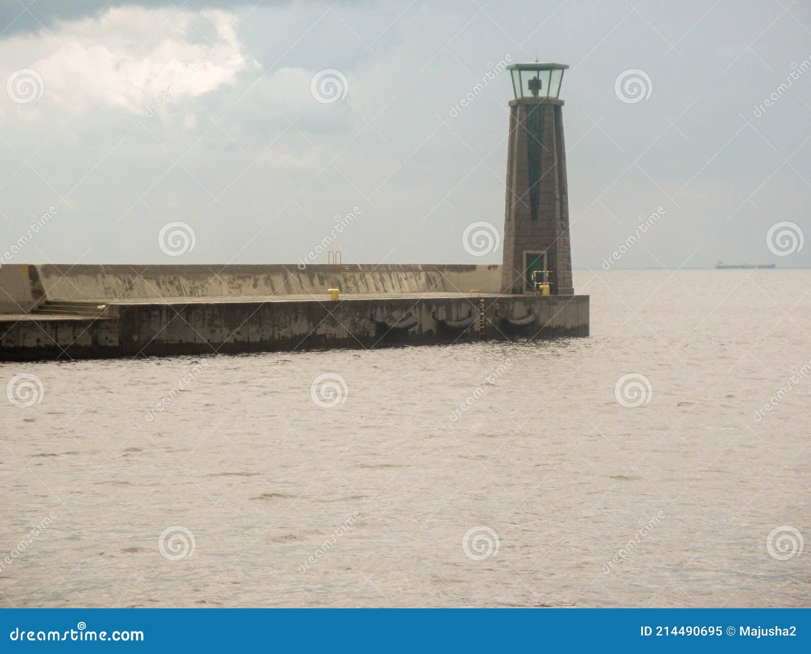 Lighthouse at the Edge of the Pier Stock Image - Image of pier, view ...