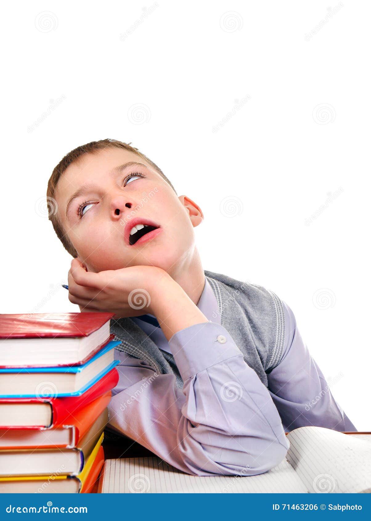 Bambino Annoiato Con I Libri Fotografia Stock - Immagine di pigro ...