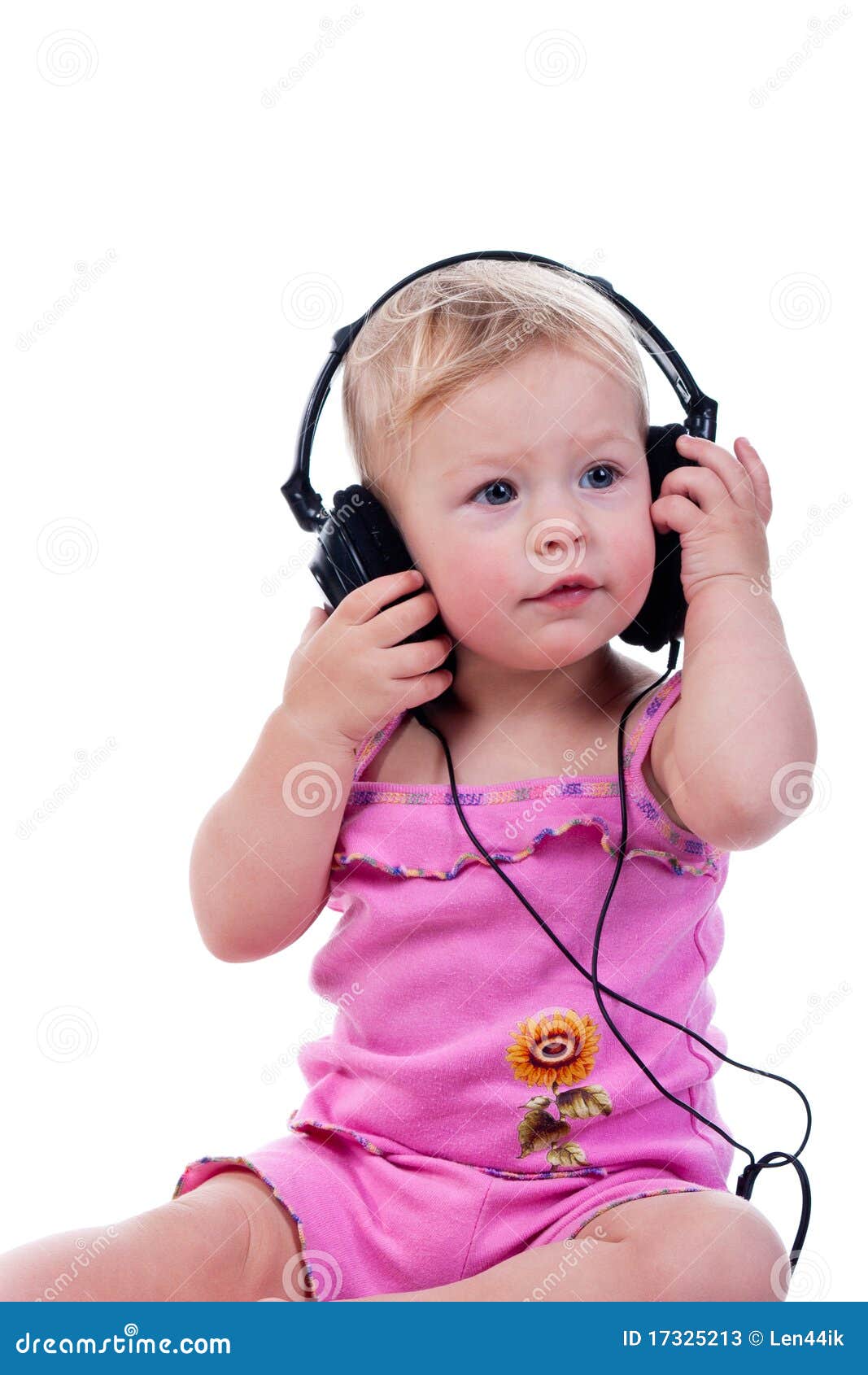 Bambino con le cuffie immagine stock. Immagine di bambino - 17325213