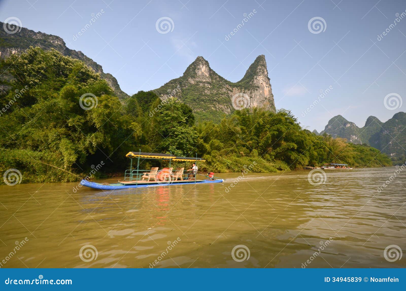 Bamboo boats in Yangshuo editorial stock image. Image of scenic - 34945839