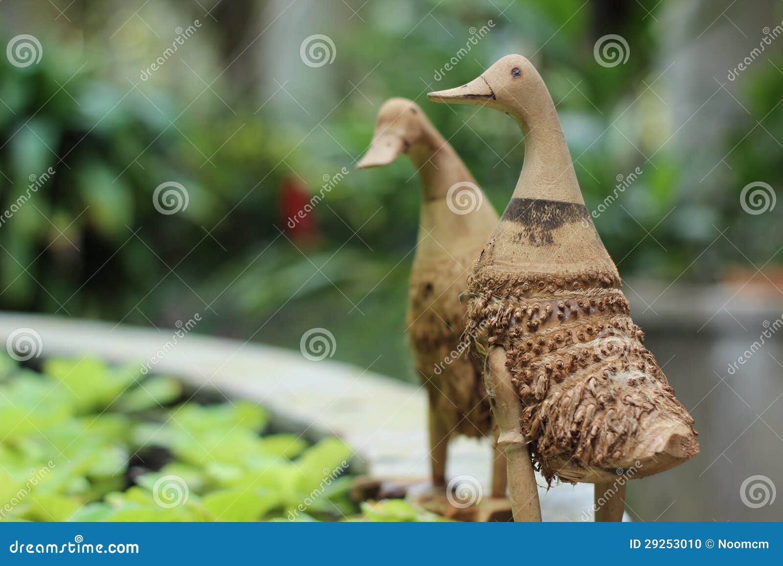 Bamboo duck on basin edge stock photo. Image of closeup - 29253010
