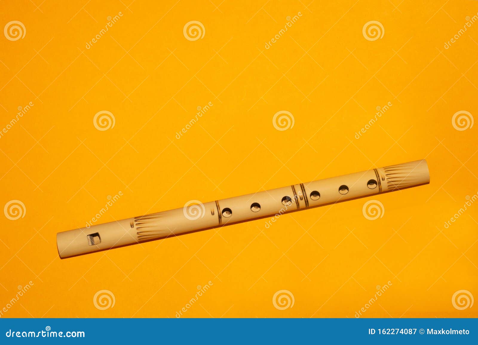 Bamboo Flute. Simple Wind Instrument on Yellow Background Stock Image ...