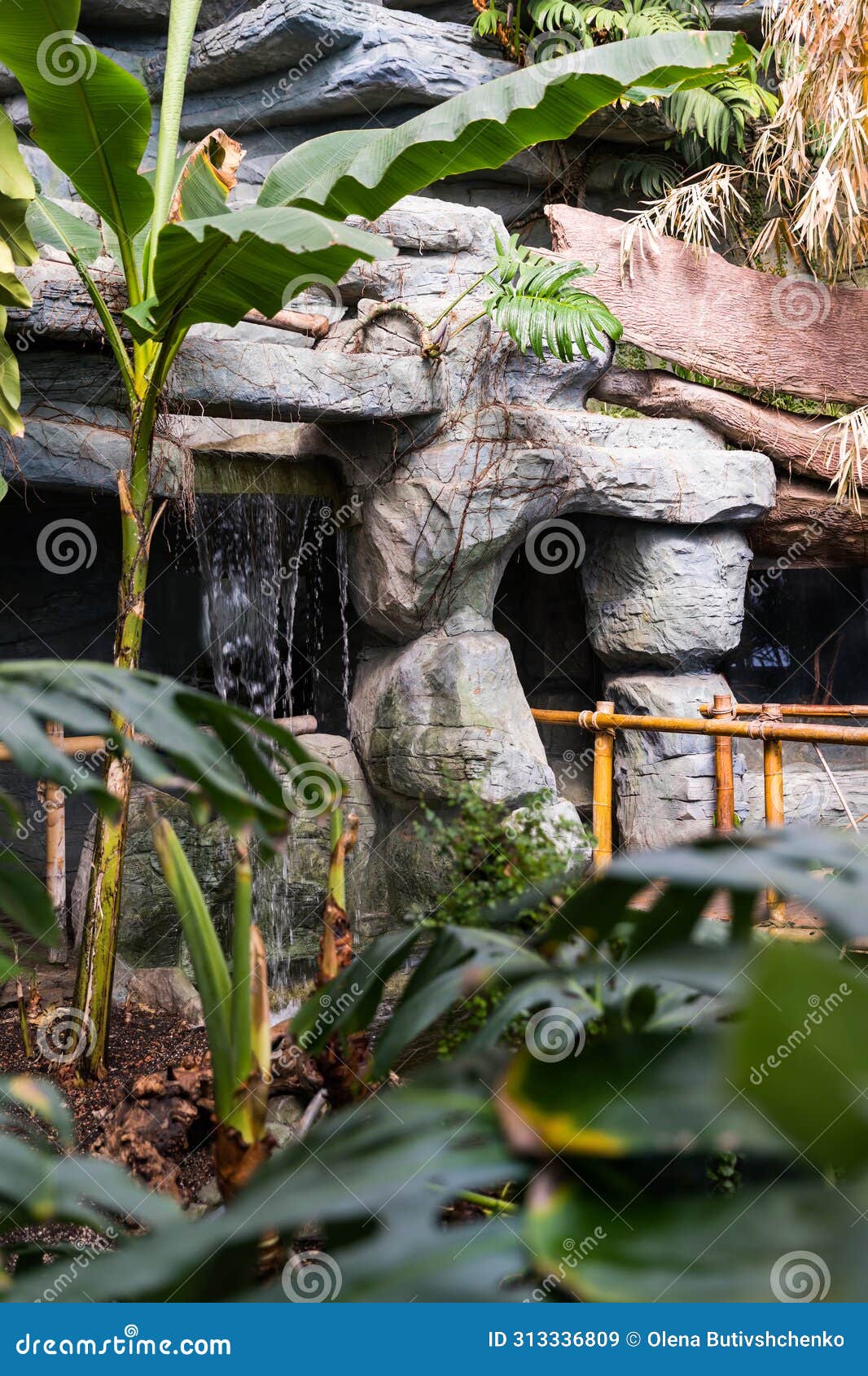 A Bamboo Path and a Grotto with a Waterfall Against the Backdrop of ...