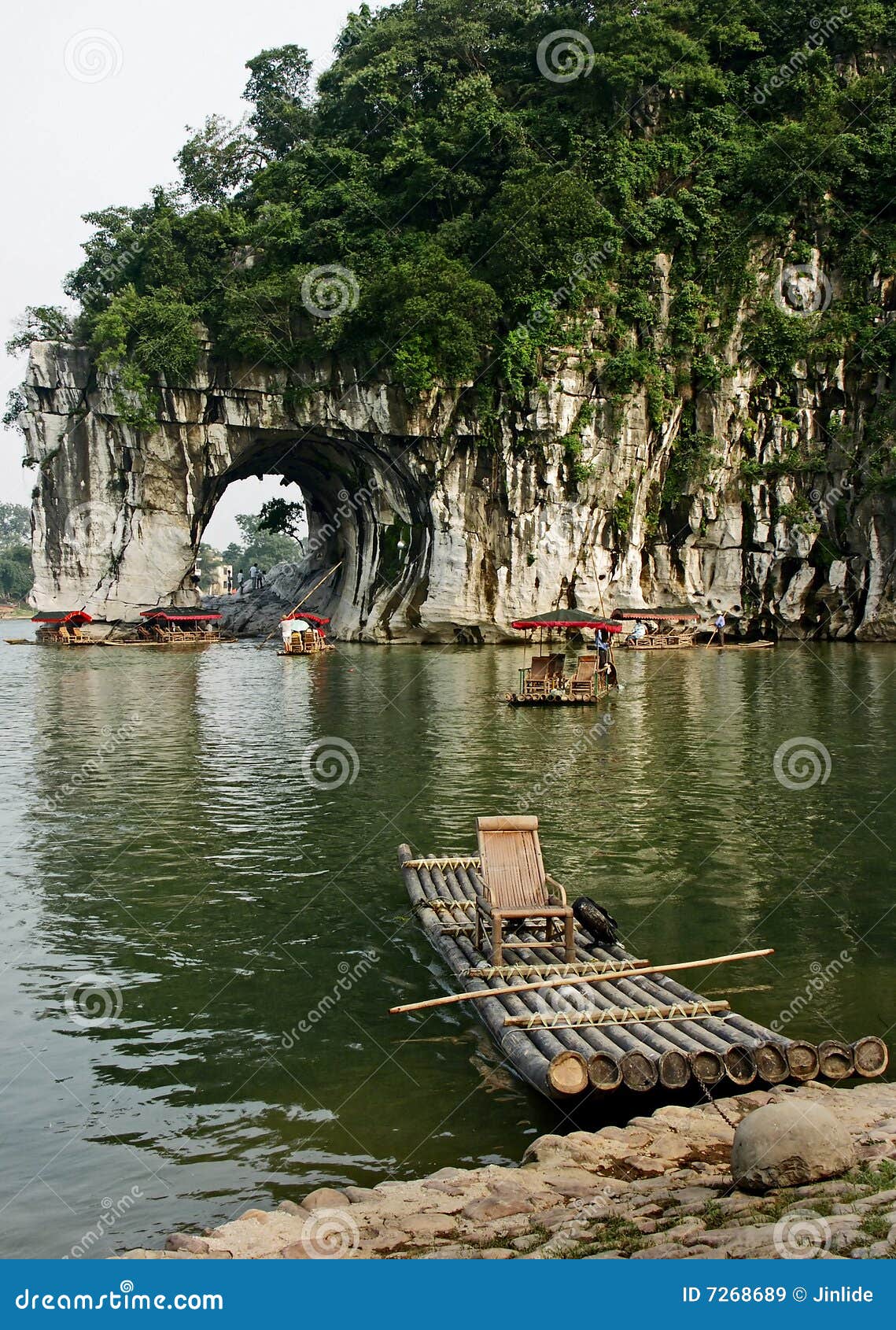 A Bamboo Raft in Front of Elephant Trunk Hill Stock Image - Image of ...