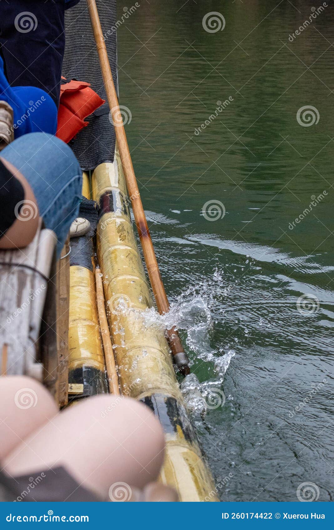 Bamboo raft in moving stock photo. Image of rowing, kayak - 260174422