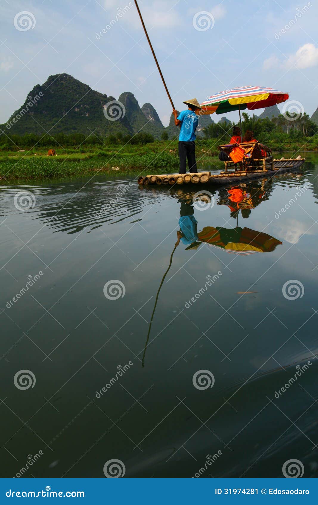 Man Rowing bamboo raft editorial photo. Image of worker - 31974281