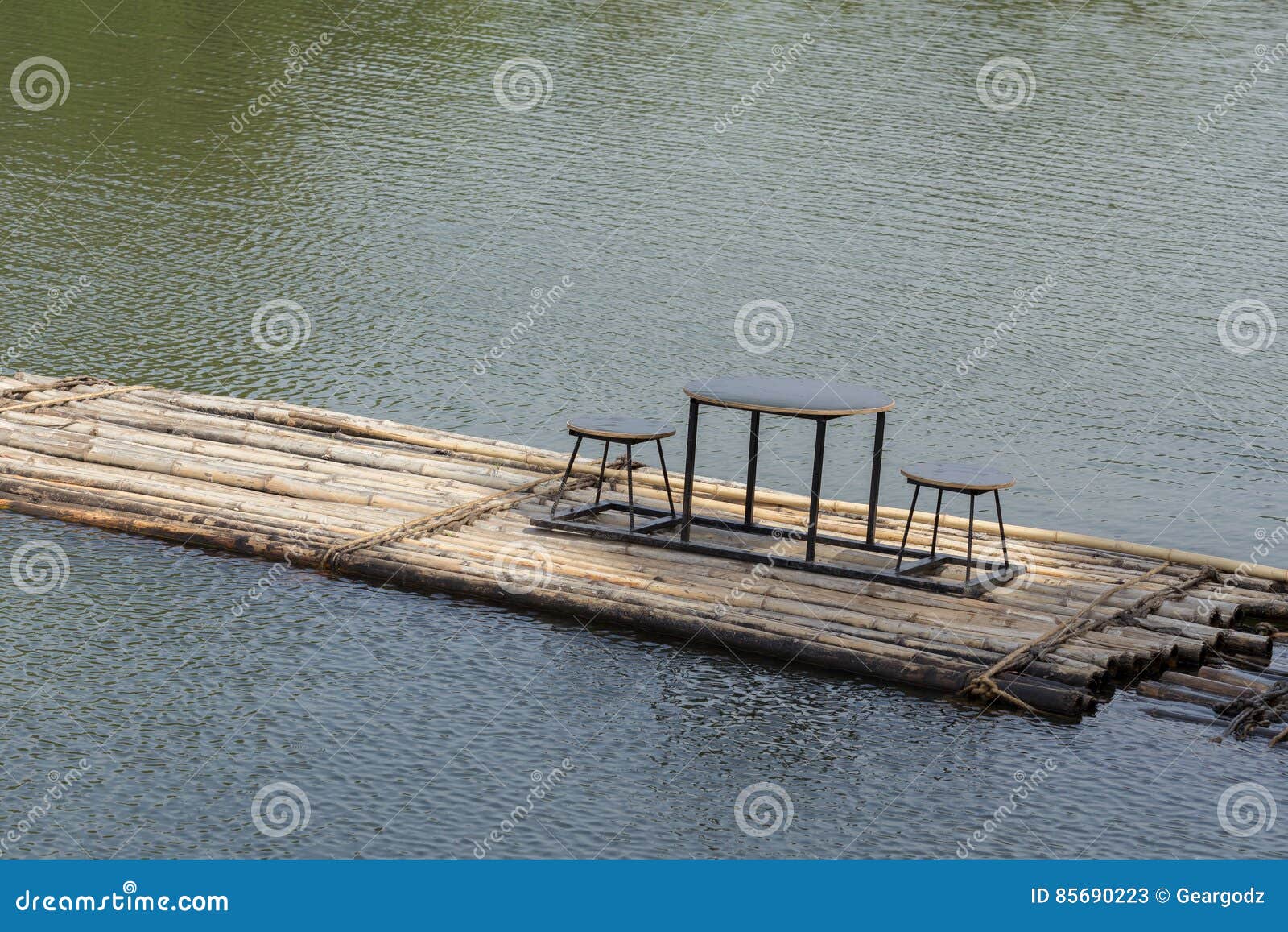 Bamboo Rafts Floating in River and Dining Table and Chair Stock Image ...