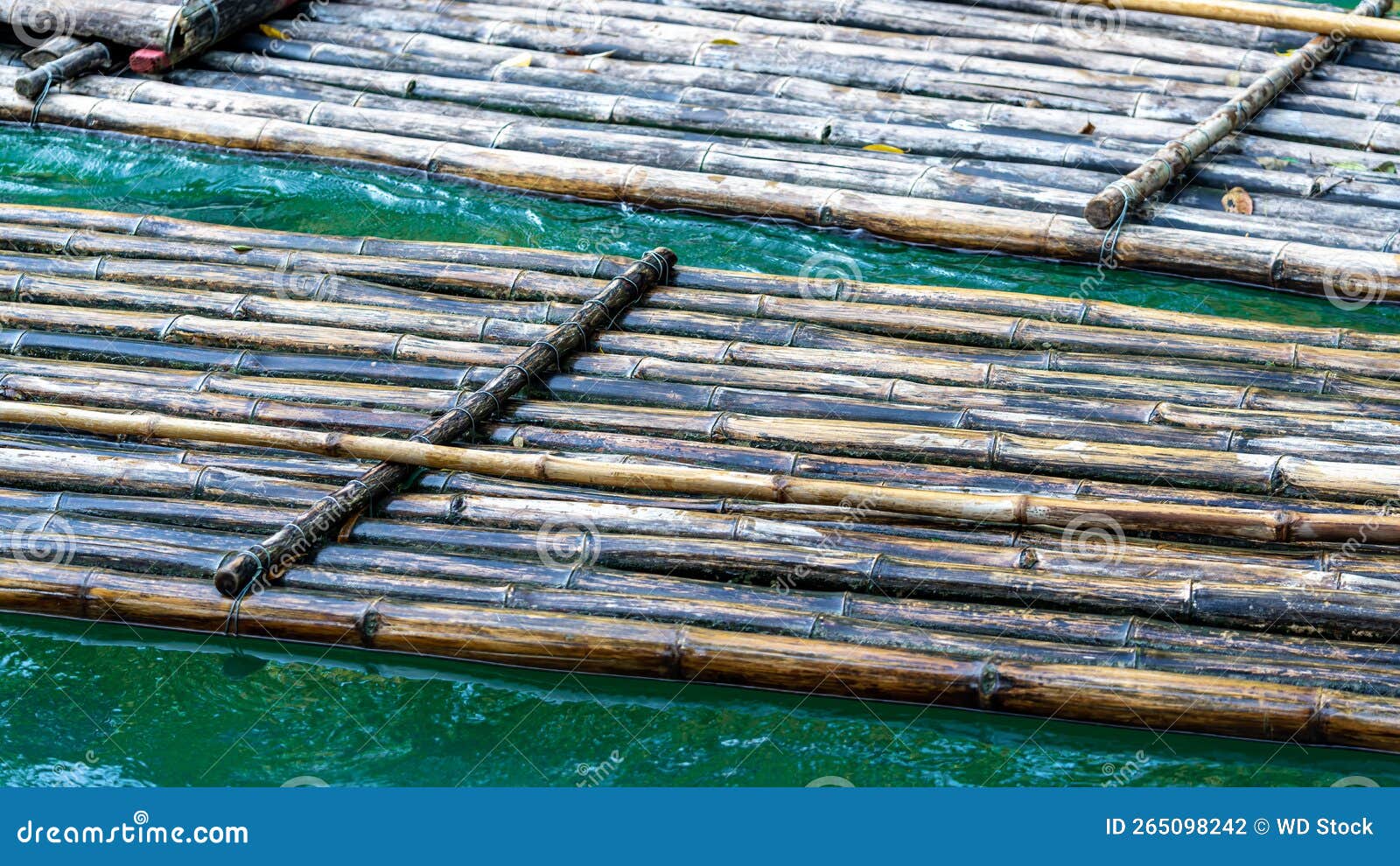 Bamboo rafts on a river stock photo. Image of kayak - 265098242