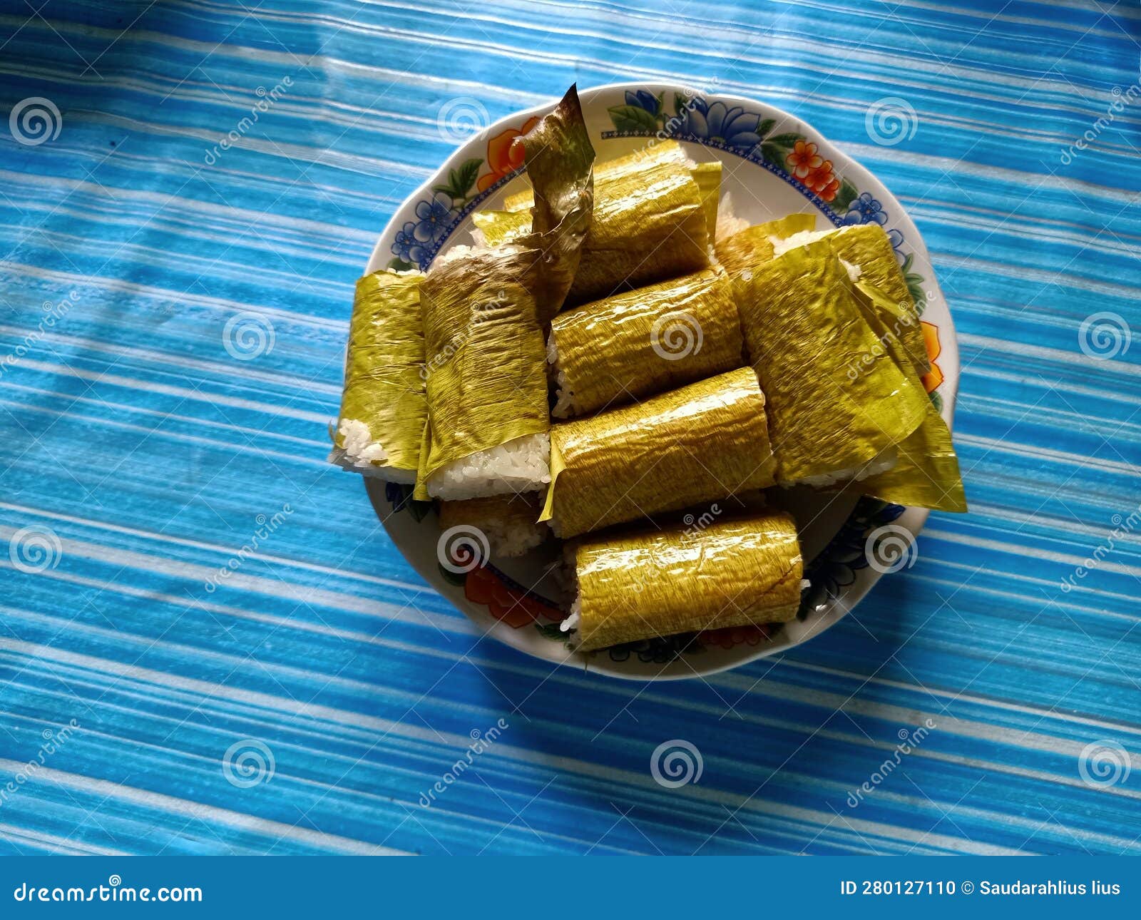 Bamboo rice ready to eat stock photo. Image of meal - 280127110