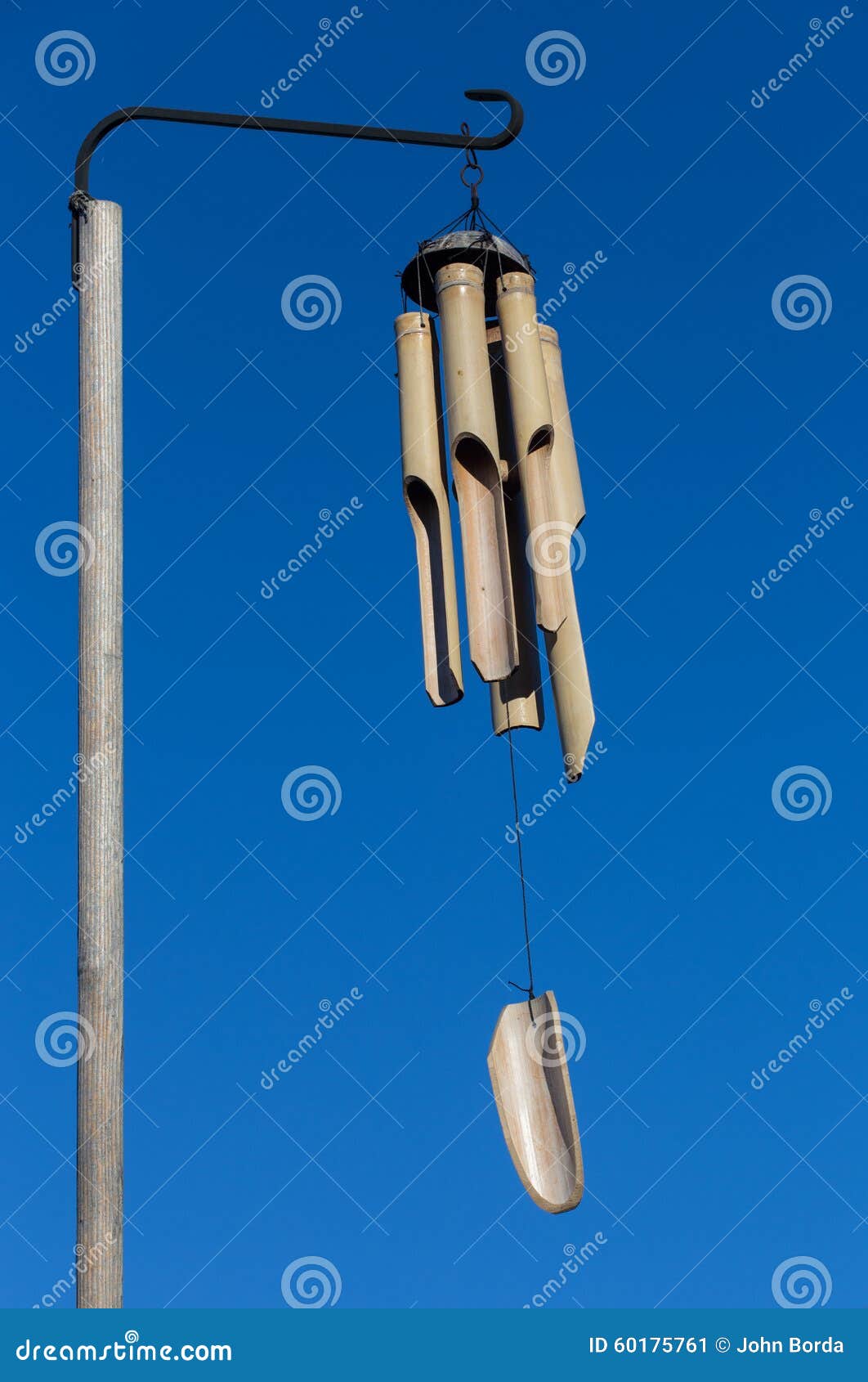 Bamboo Wind Chimes Against a Blue Sky Stock Image - Image of vertical ...