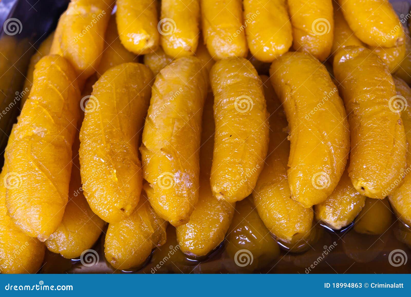 Banaan in suikerstroop stock afbeelding. Image of ingrediënten - 18994863