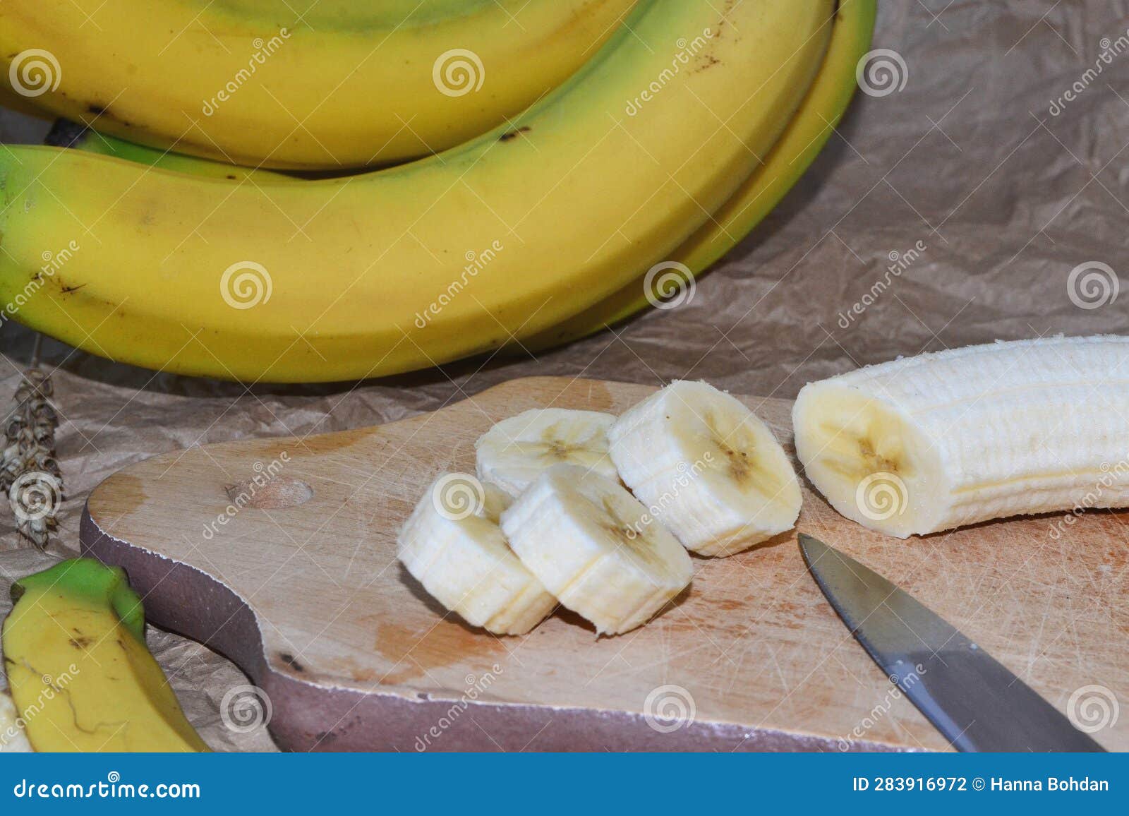 Banana Cut with a Knife on a Wooden Board Stock Photo - Image of ...