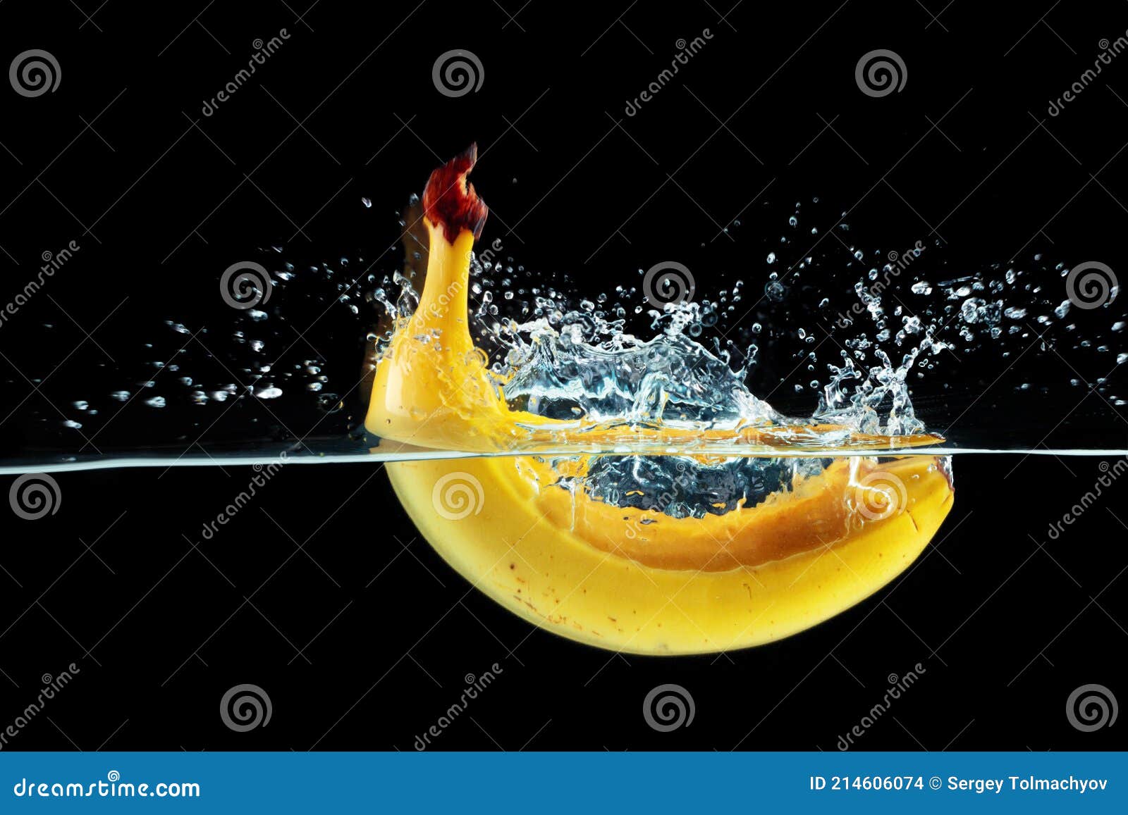 Banana Falling into the Water with a Splash Against Black Background ...
