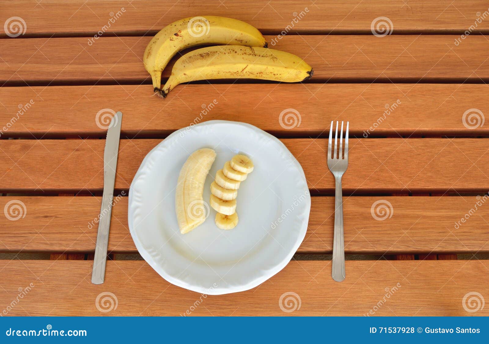 Banana on the table stock photo. Image of table, white - 71537928