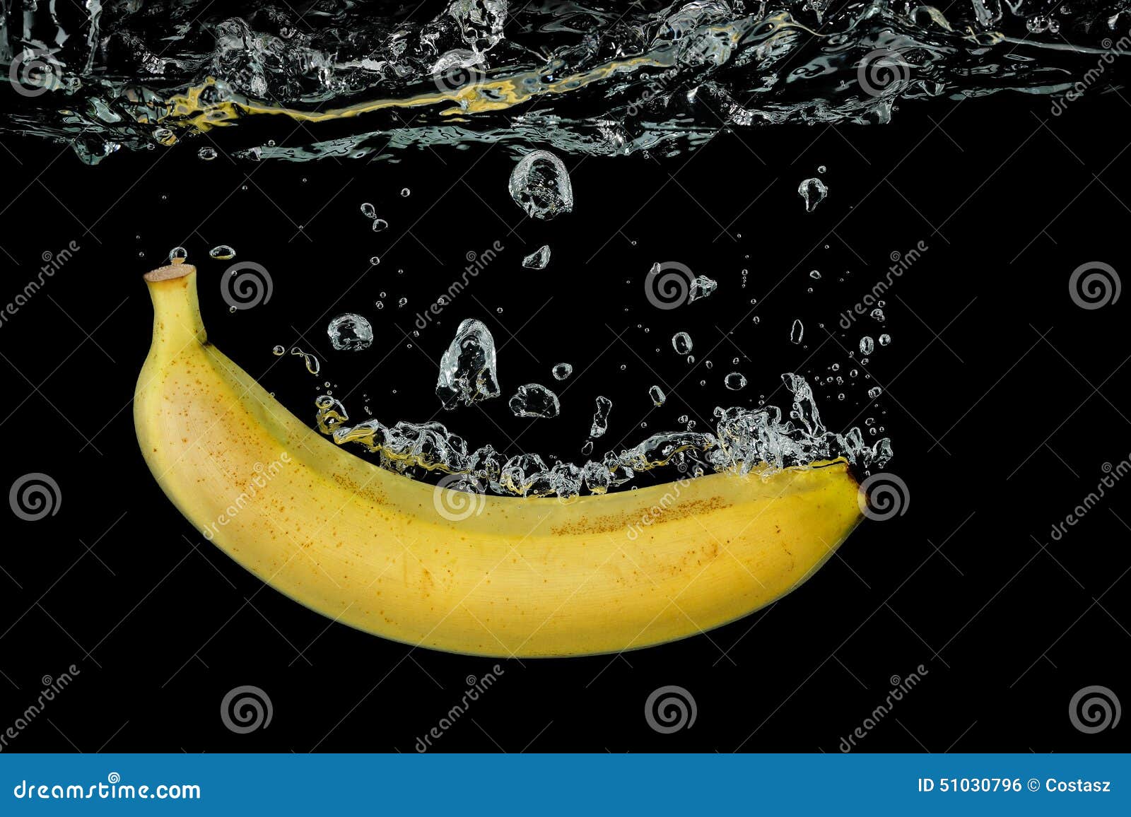 Banana in water stock photo. Image of motion, energy - 51030796