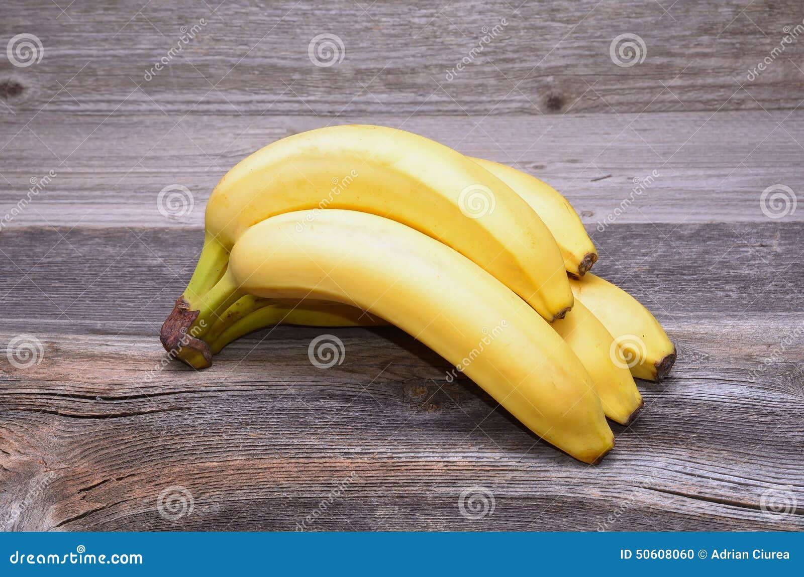Banana on a wooden table stock photo. Image of board - 50608060