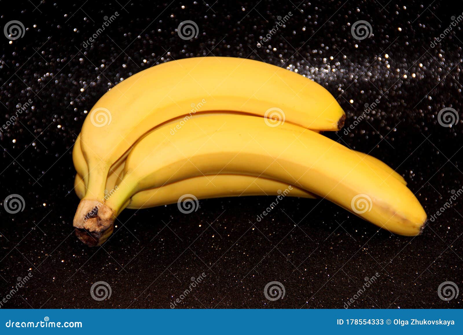 Bananas on a Black Background with Bokeh and Glitter Stock Image ... Bananas on a Black Background with Bokeh and Glitter Stock Image ...