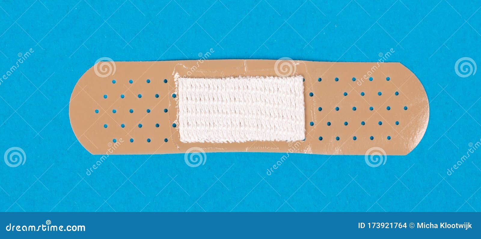 Band-aid Against a Blue Background Stock Photo - Image of wound, peal ...